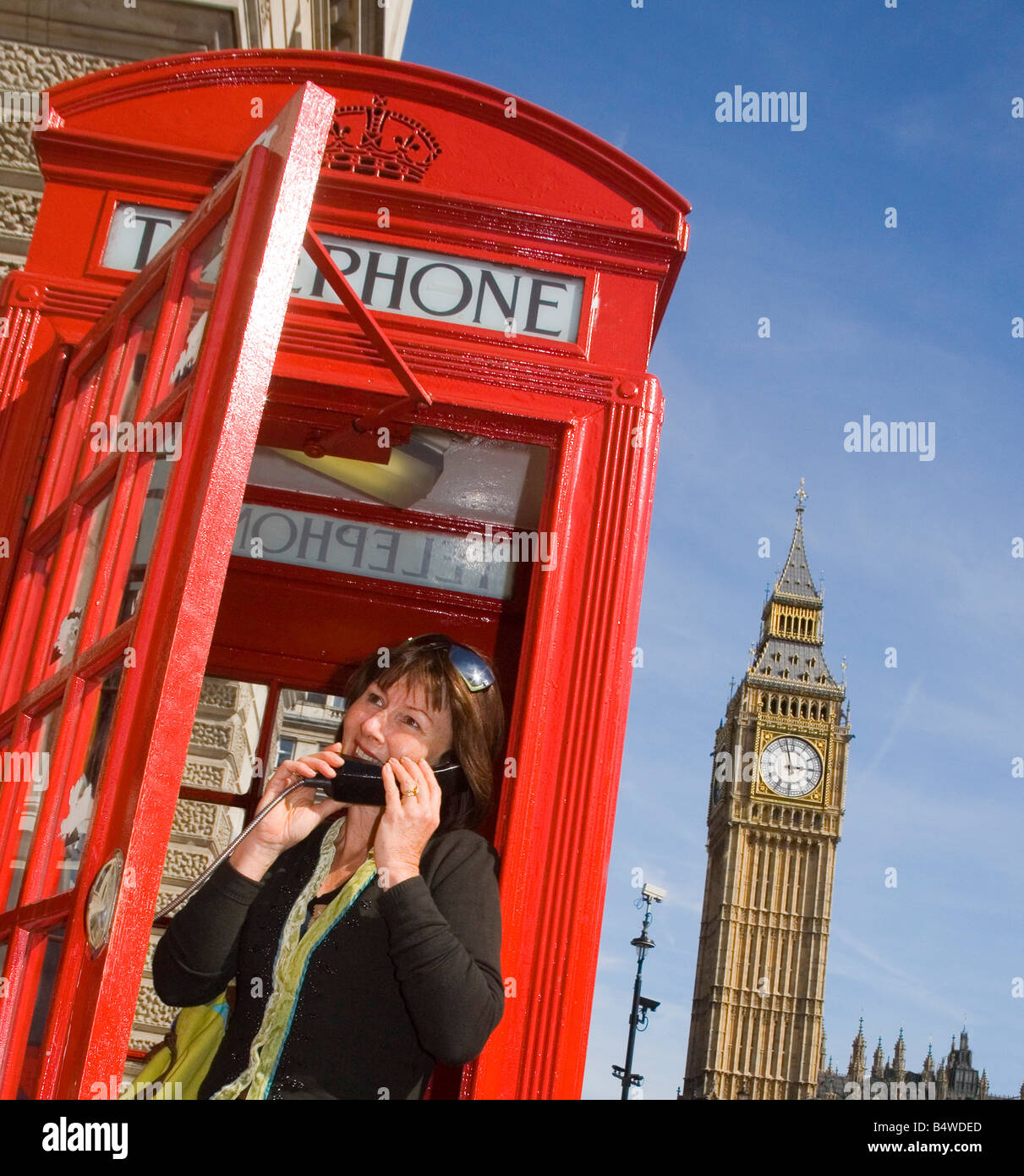 Calling home from a famous Red Telephone box next to Big Ben in ...