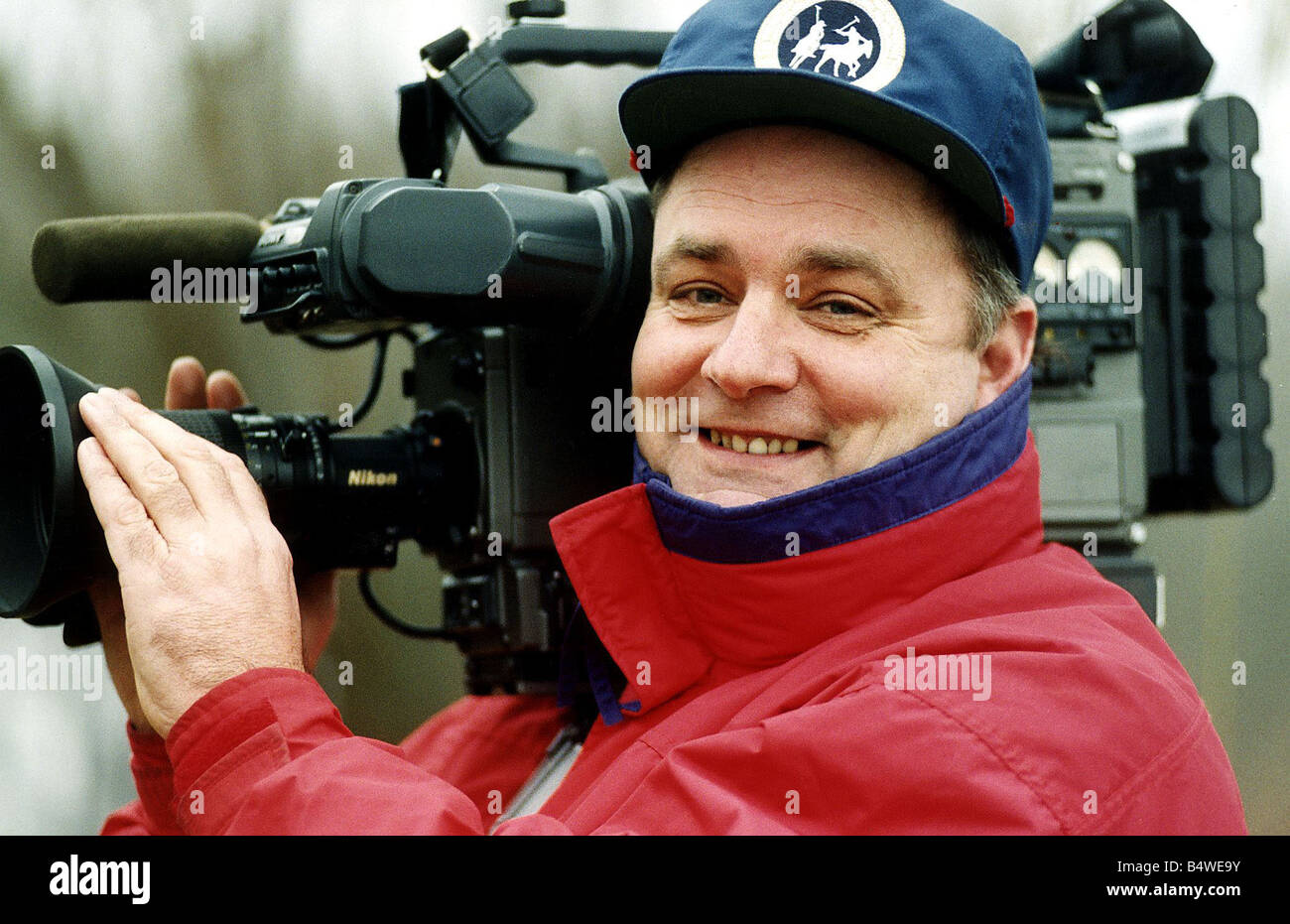 Mike Lloyd photographer holding video camera Stock Photo - Alamy