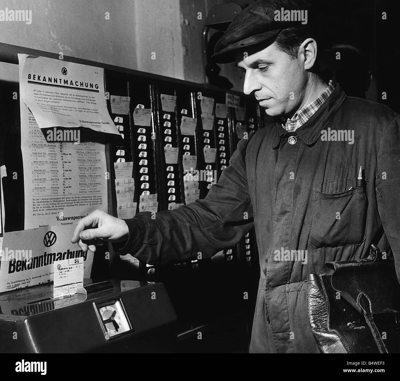 German Car Worker Heinrich Gemnich December 1953 clocks on at the ...