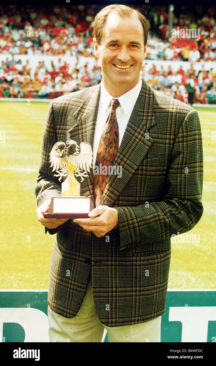 George Graham Arsenal manager holding Barclays manager award trophy ...