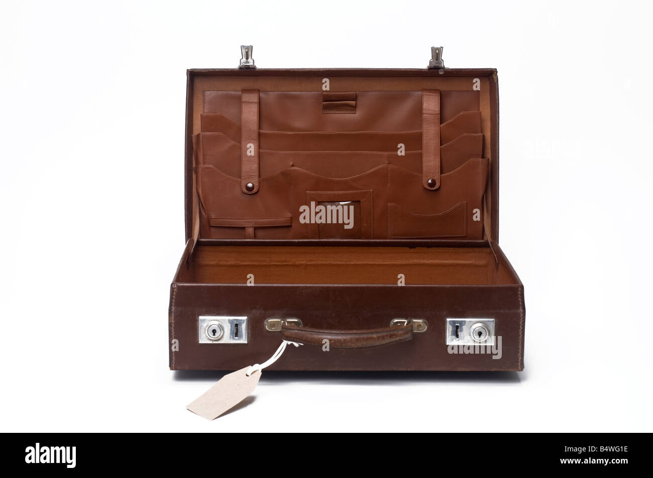 An old brown leather attache case with a label Stock Photo - Alamy