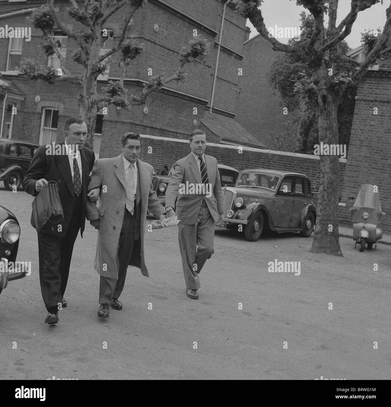 Escaped Prisoner Dennis Stafford Seen Here Being Escorted Back To