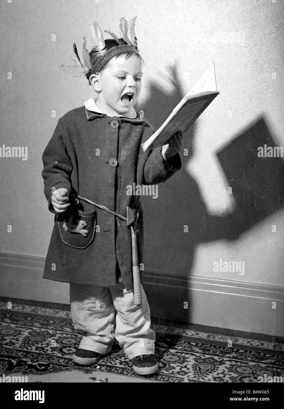 David Lea three and a half practices his christmas carols before going ...
