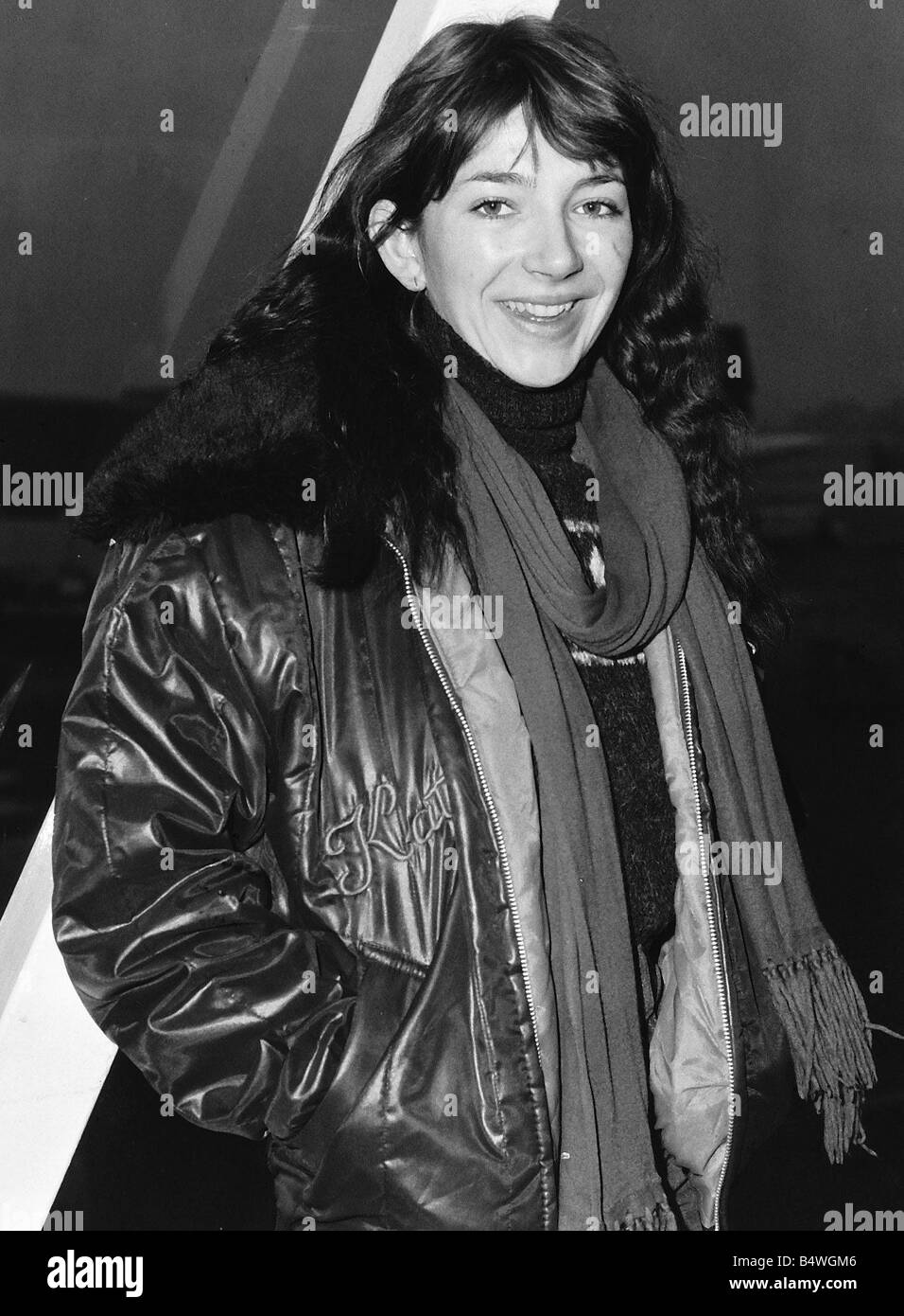 Pop singer Kate Busharriving at London Airport wearing a leather jacket ...