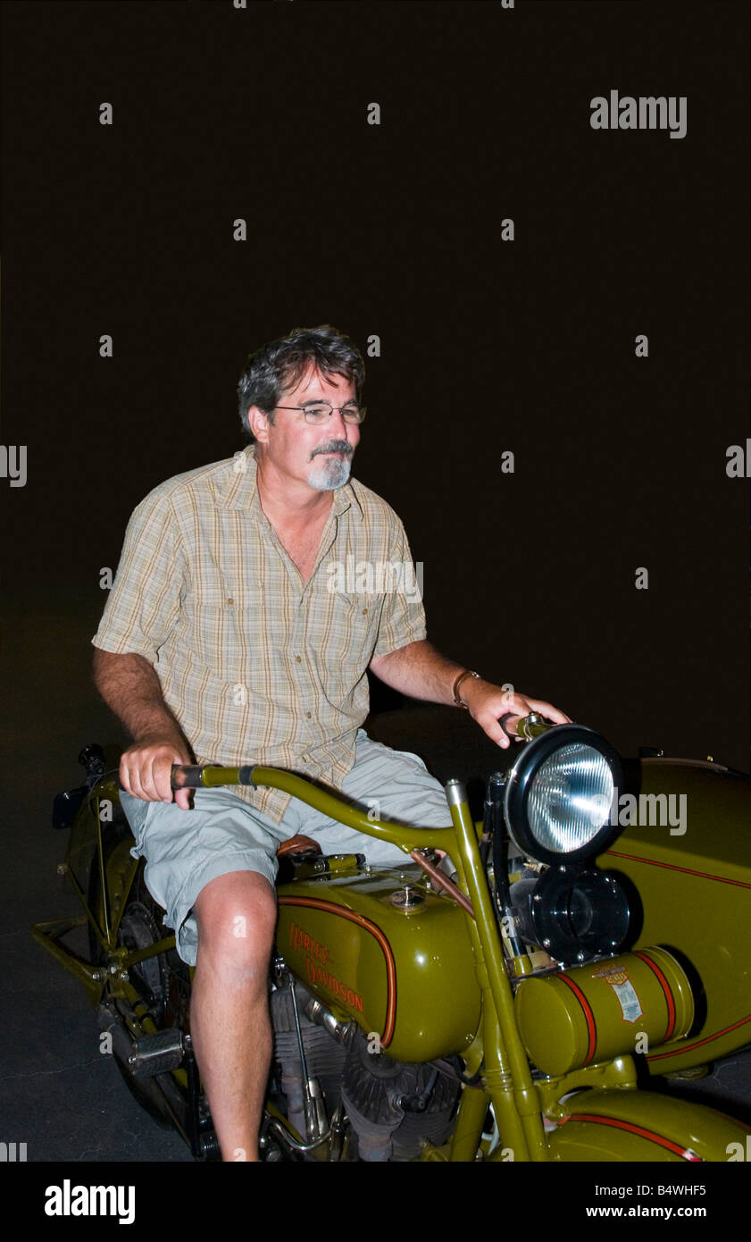 Middle aged man riding motorcycle hi-res stock photography and images ...