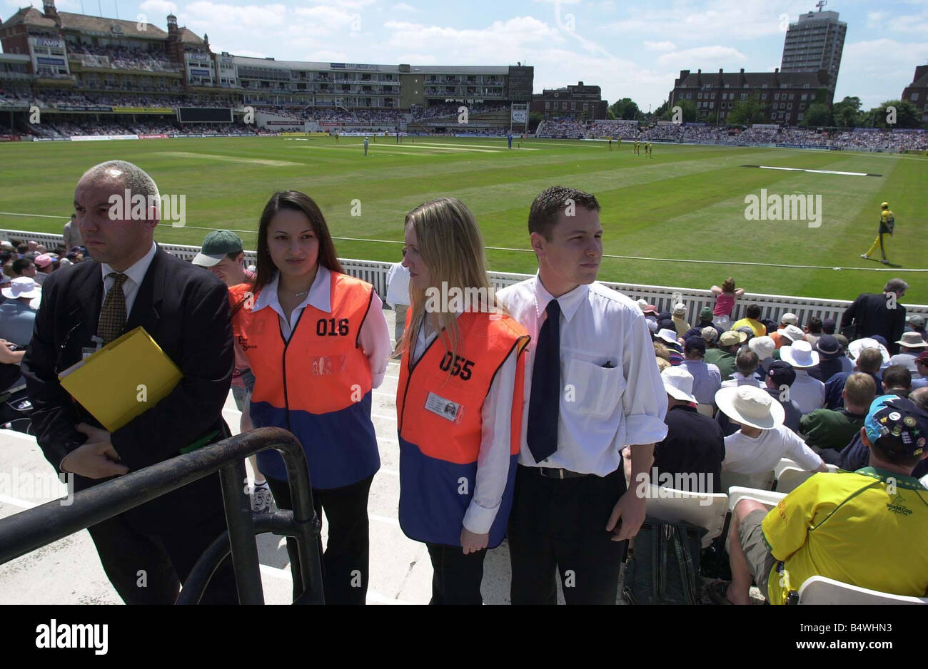 Martin Rogers Jun 2001 and stewards survey the crowd at the Oval for ...
