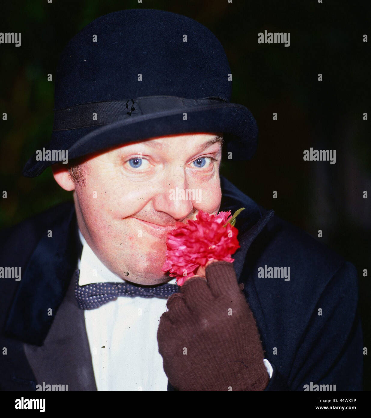 Jimmy Cricket comedian September 1986 sniffing smelling a flower Stock ...