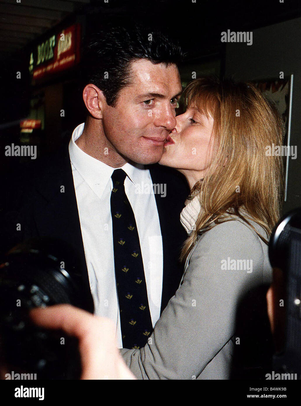 Scotland rugby skipper Gavin Hastings being kissed on the cheek by his ...