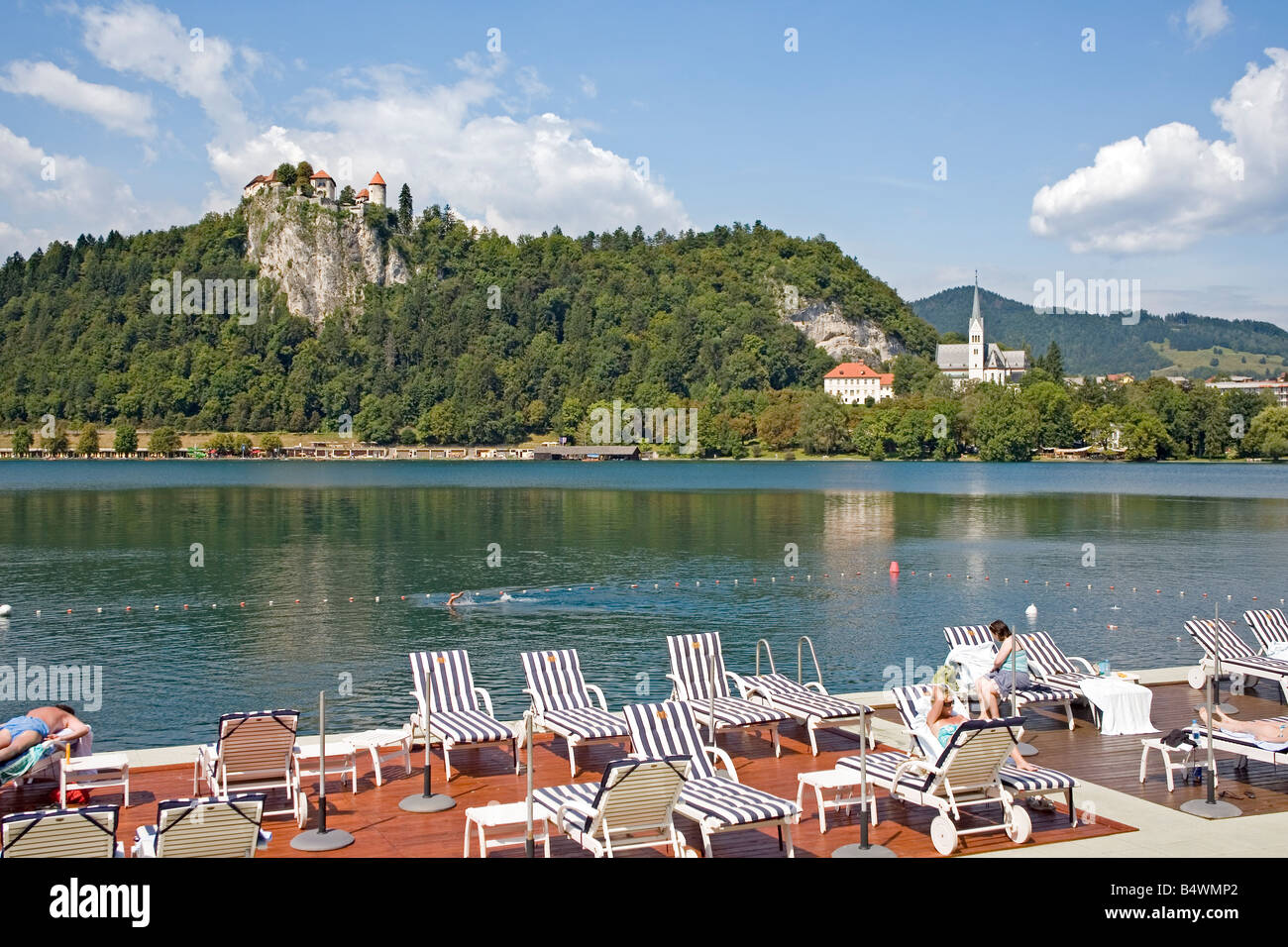Lake Bled Republic of Slovenia Europe People bathing and sunning on the ...