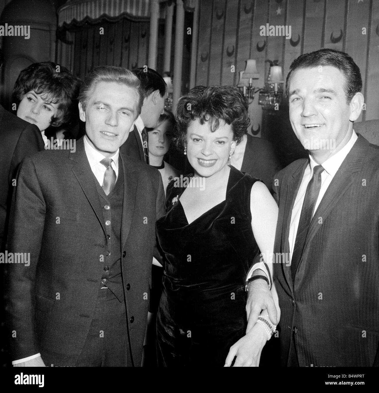Film actress Judy Garland with pop singer Adam Faith (left) and Radio ...