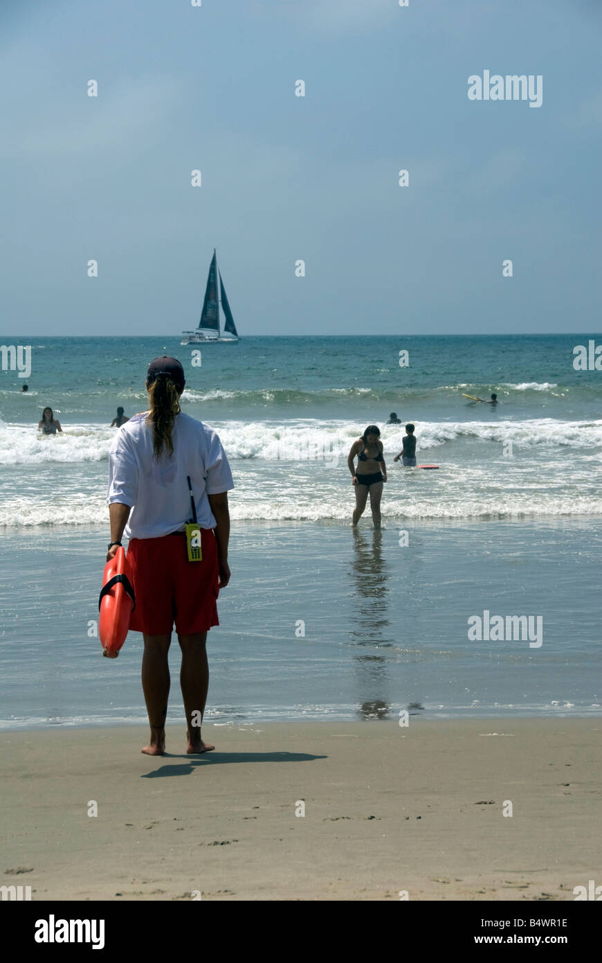 Santa Monica Beach CA People Crowd relaxing, swimming, sunning and ...
