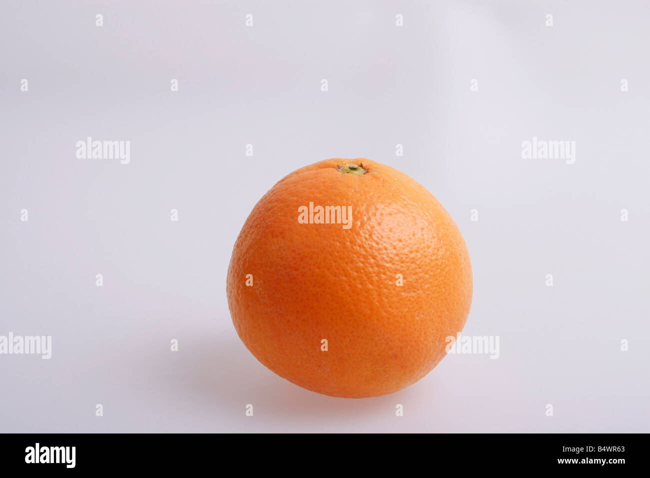 a single orange Stock Photo - Alamy