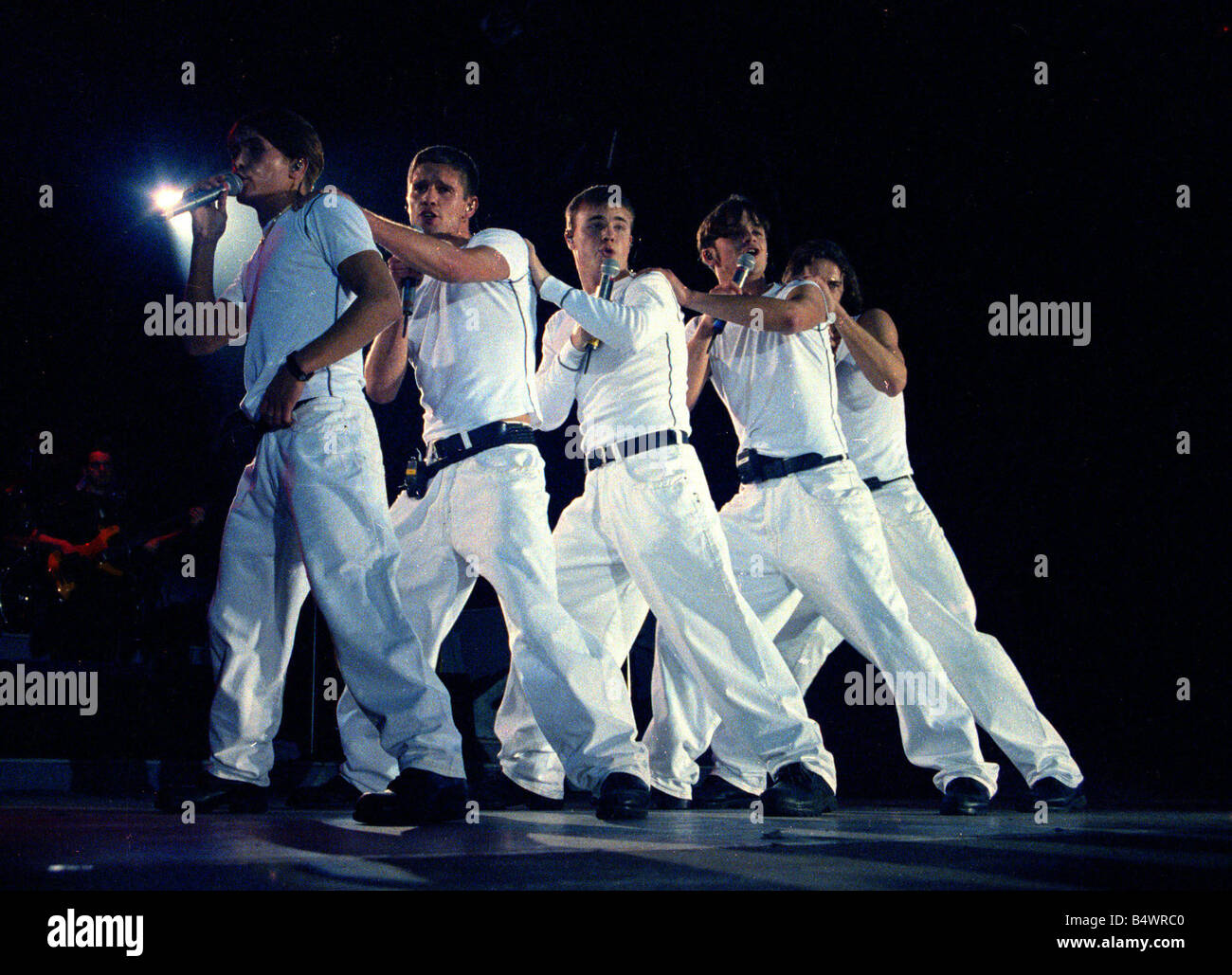 Take That live on stage during a concert August 1993 Stock Photo - Alamy