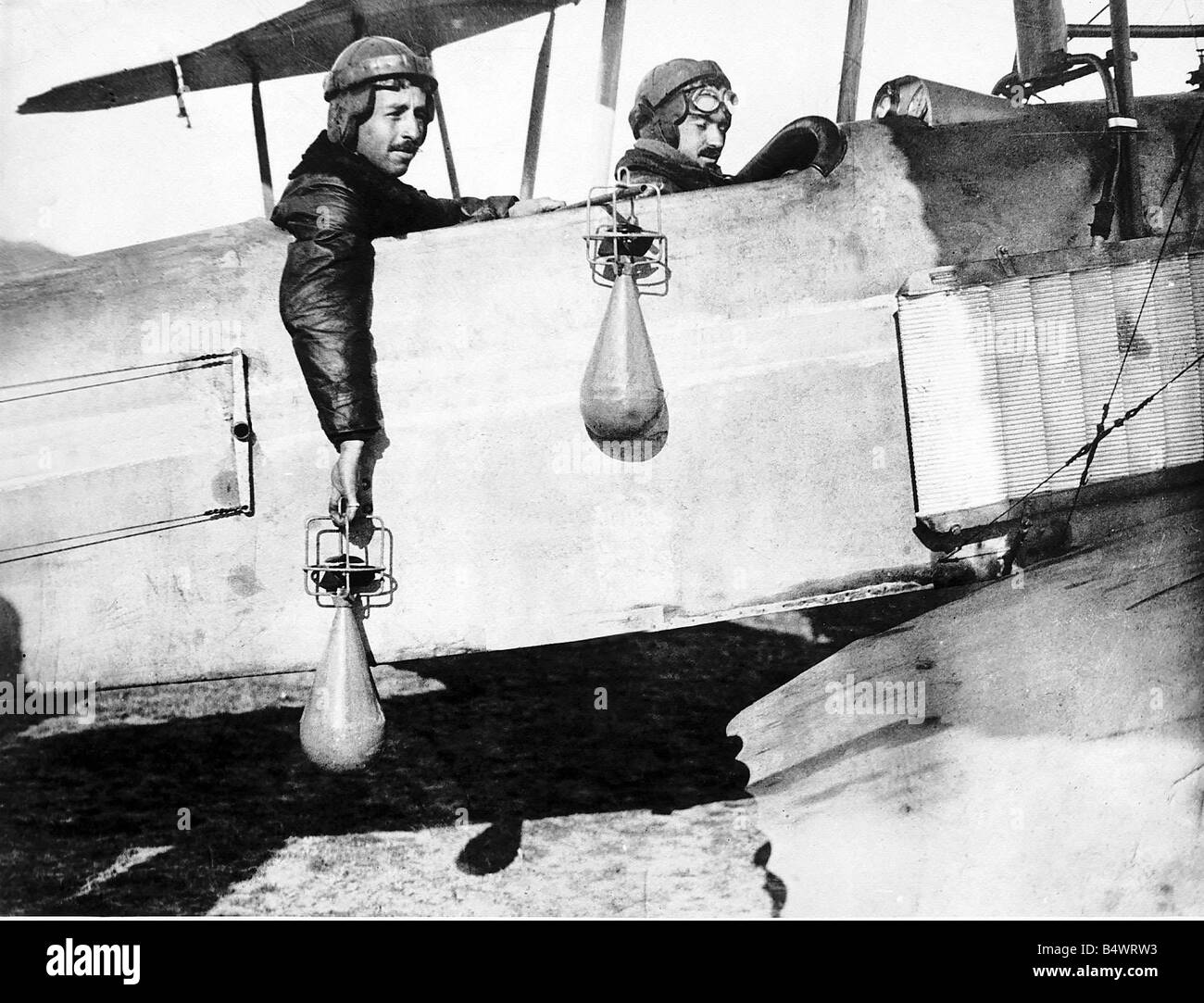 British airmen drop handbombs from their bi plane 1914 World War One ...