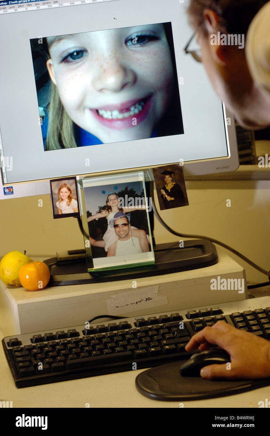 Family photographs on a computer in the workplace 15th Nov 2006 Stock ...