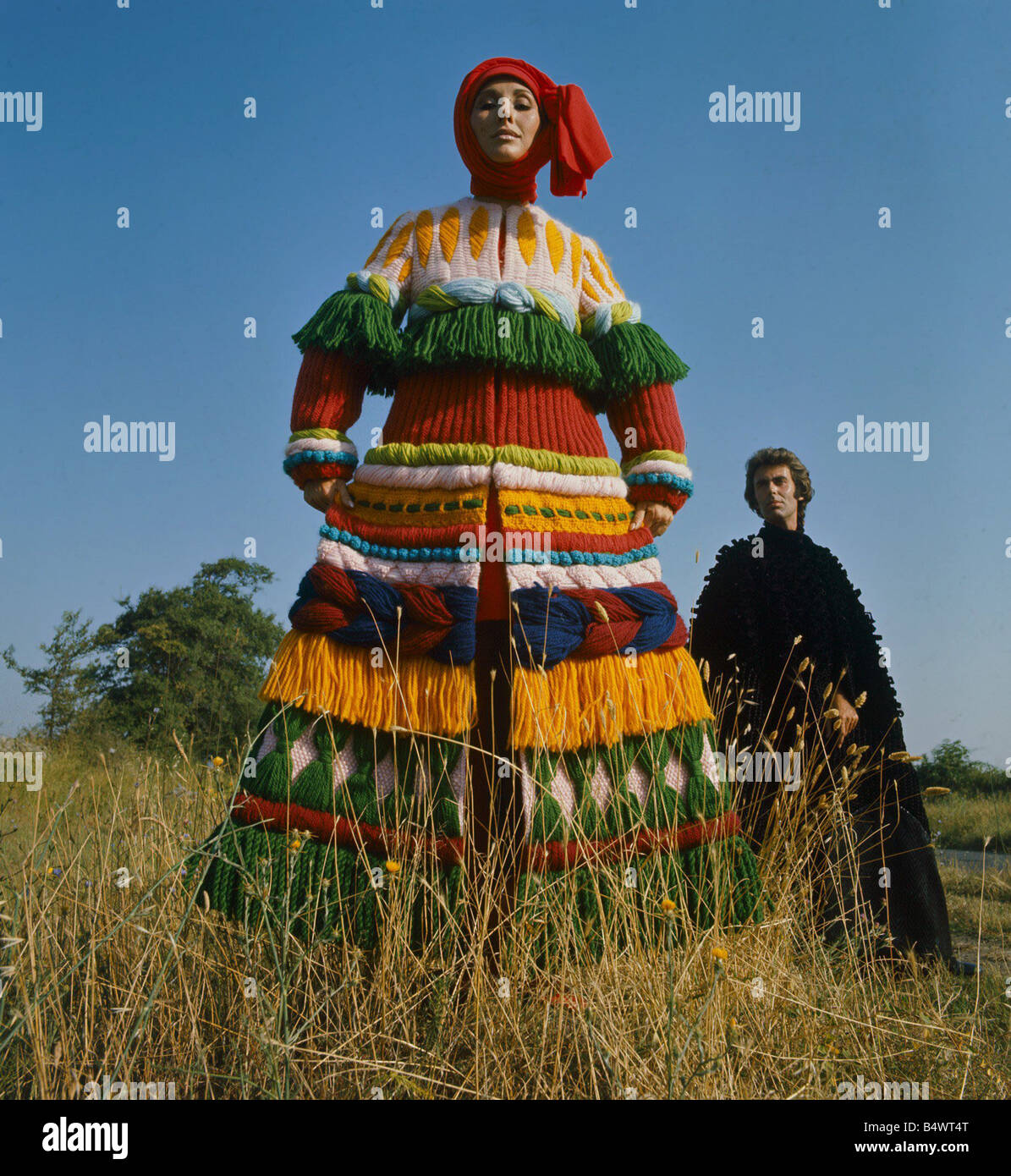 Model wearing a knitted wool Russian styled peasant costume designed by ...
