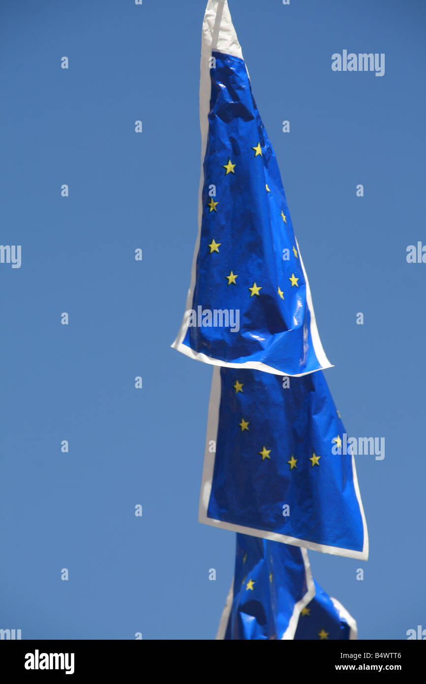 many european union flags flying in wind in sun Stock Photo - Alamy