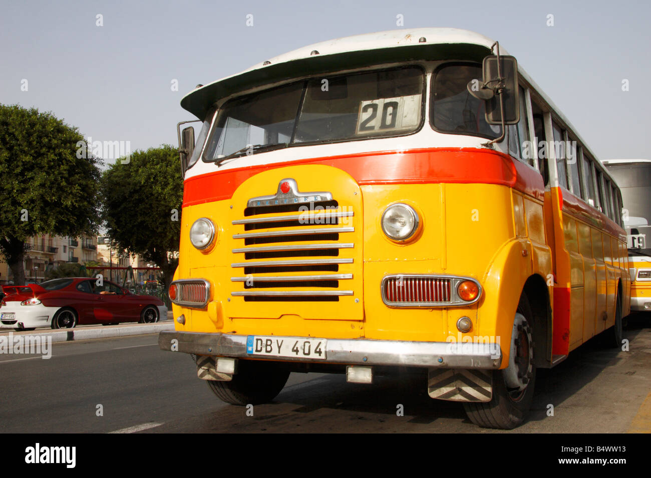 A bright yellow Bedford, Maltese bus at Marsaskala in Malta Stock Photo ...