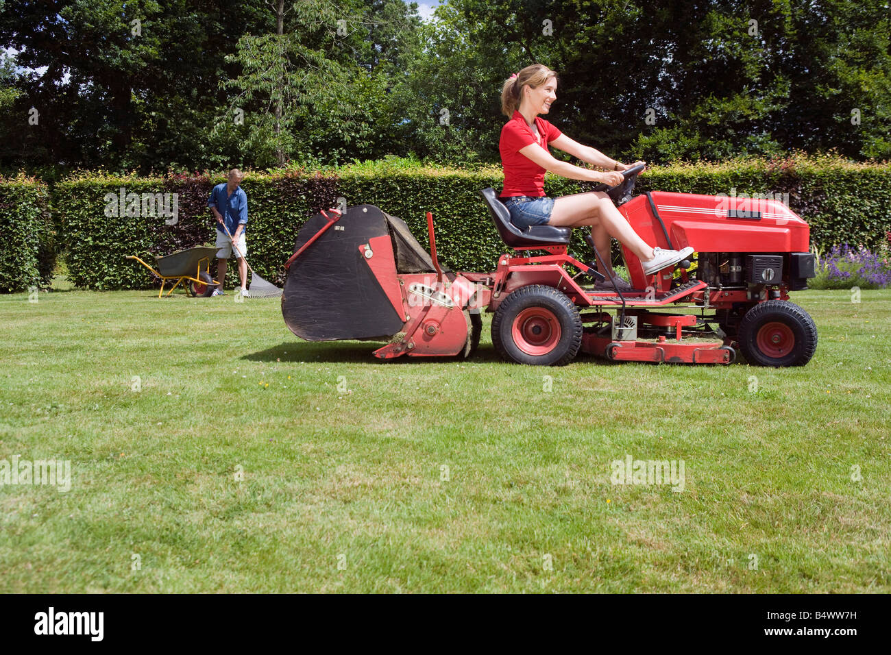 Driving wheelbarrow hi-res stock photography and images - Alamy