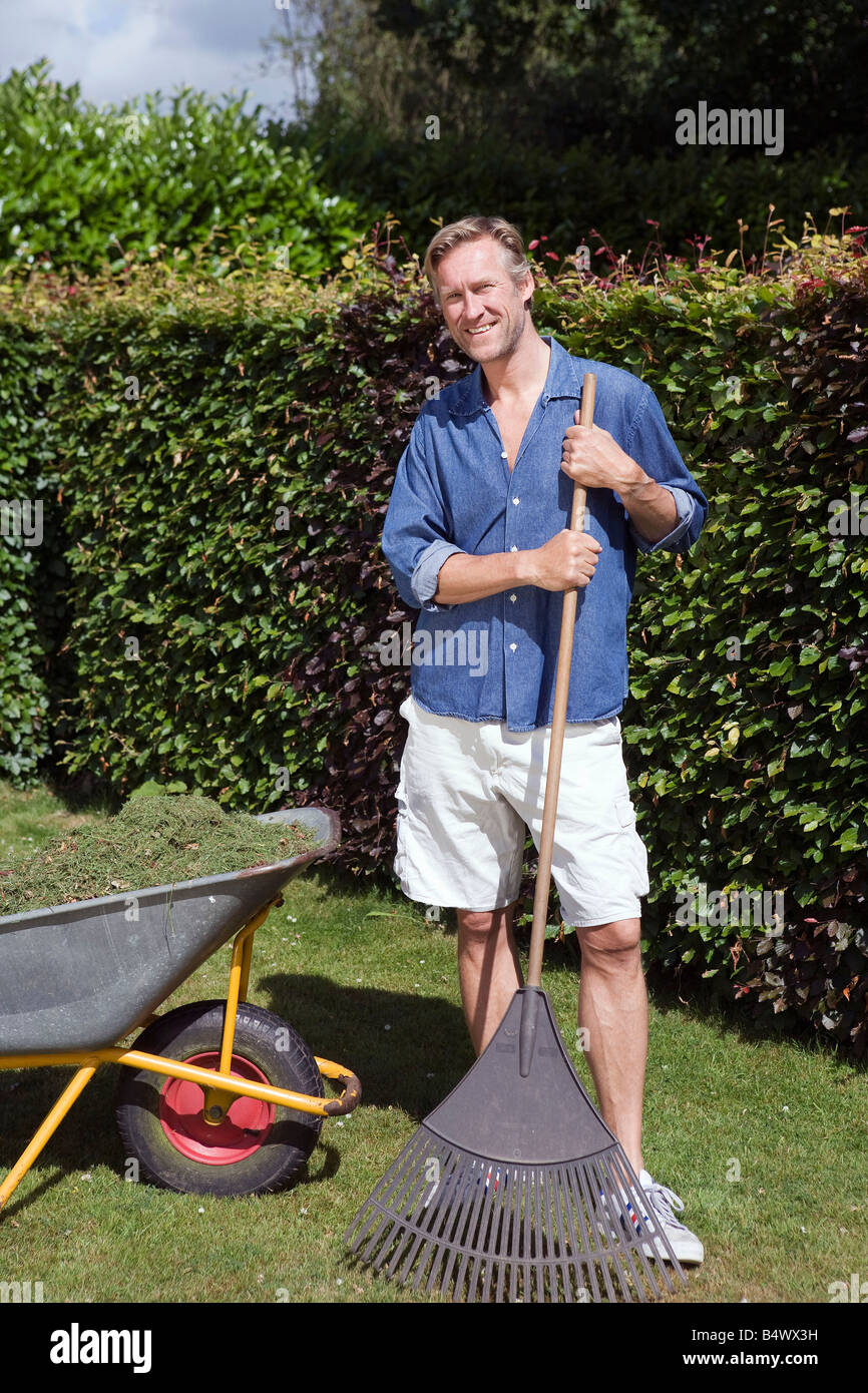 Garden rake wheelbarrow hi-res stock photography and images - Alamy