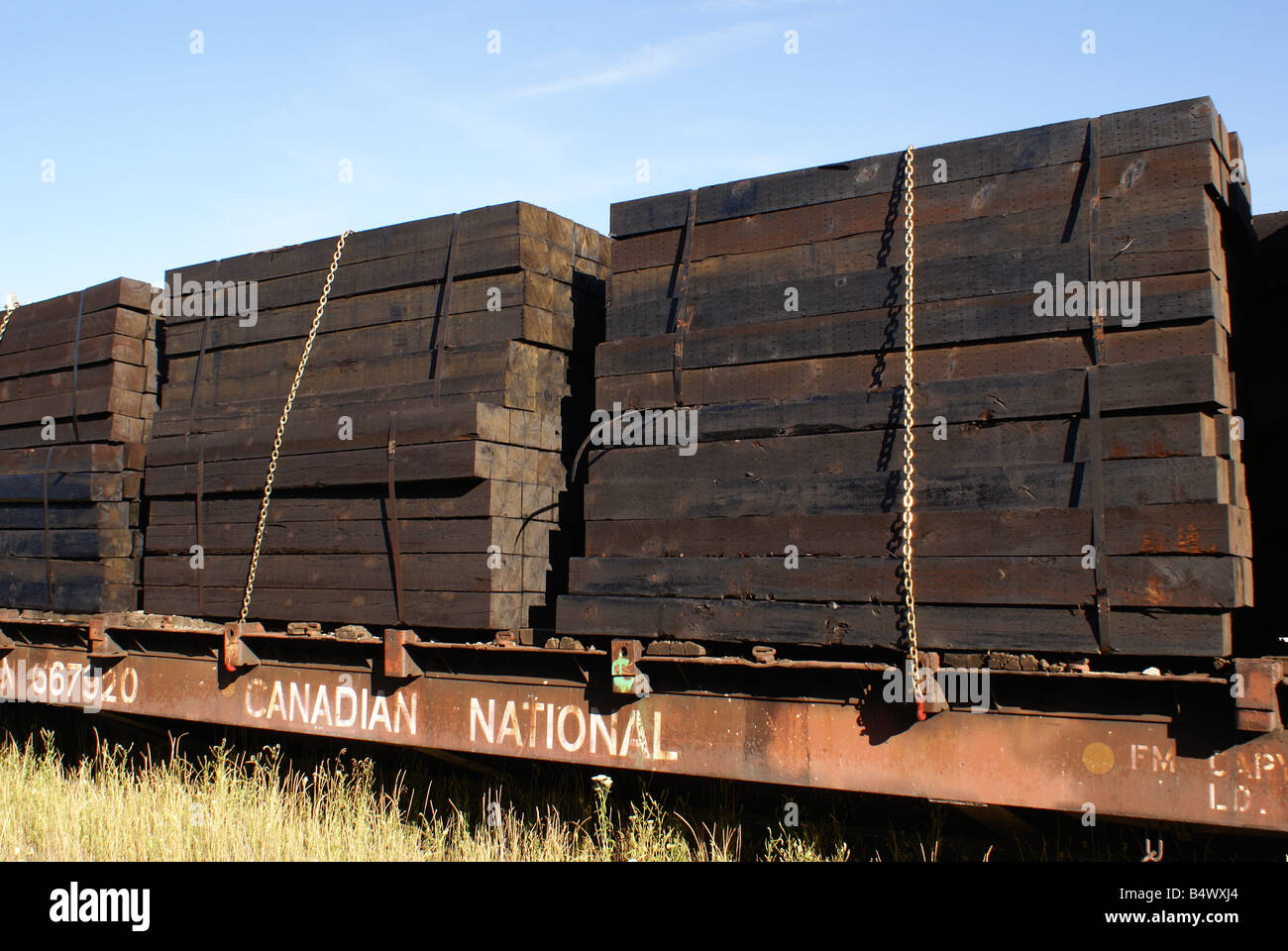 replacement railway ties stacked up CN Rail Manitoba Stock Photo - Alamy