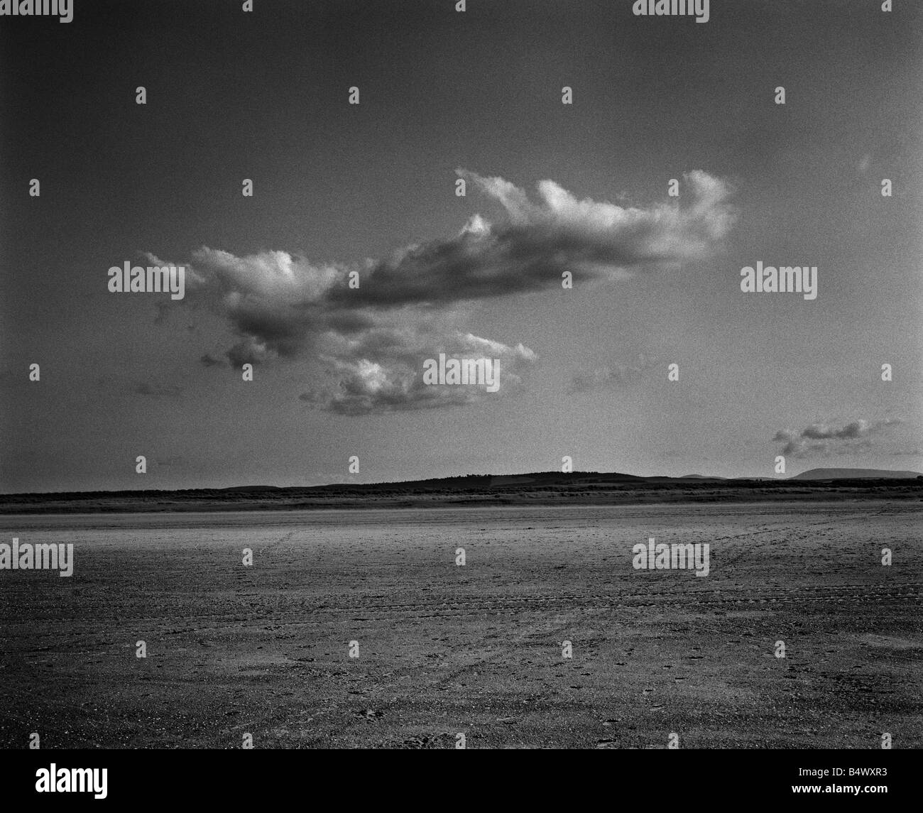 Clouds of sandy beach in Northumberland Stock Photo - Alamy