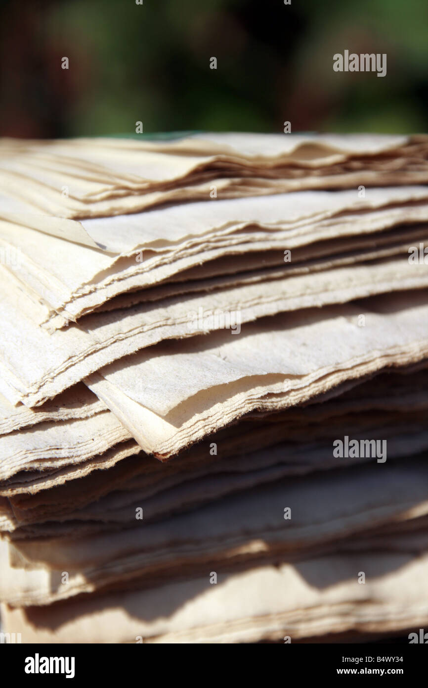 pile of old faded newspapers outdoors in sun Stock Photo - Alamy
