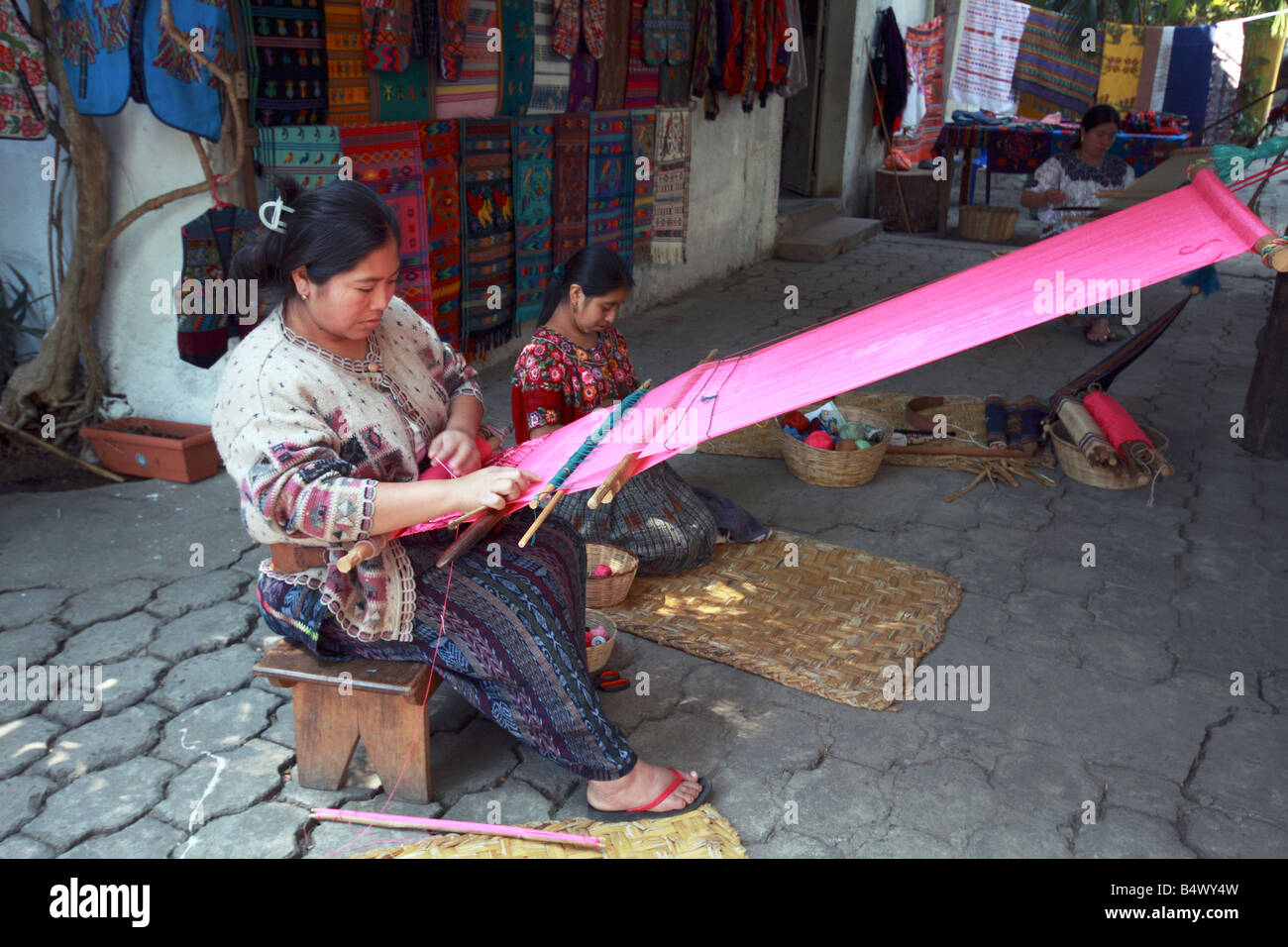 Women weaving colonial hi-res stock photography and images - Alamy