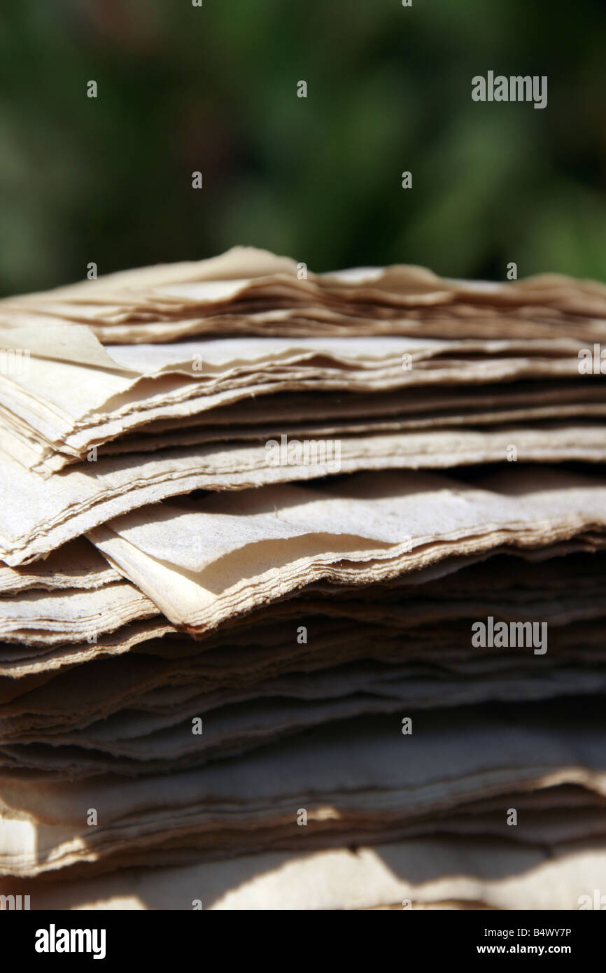 pile of old faded newspapers outdoors in sun Stock Photo - Alamy