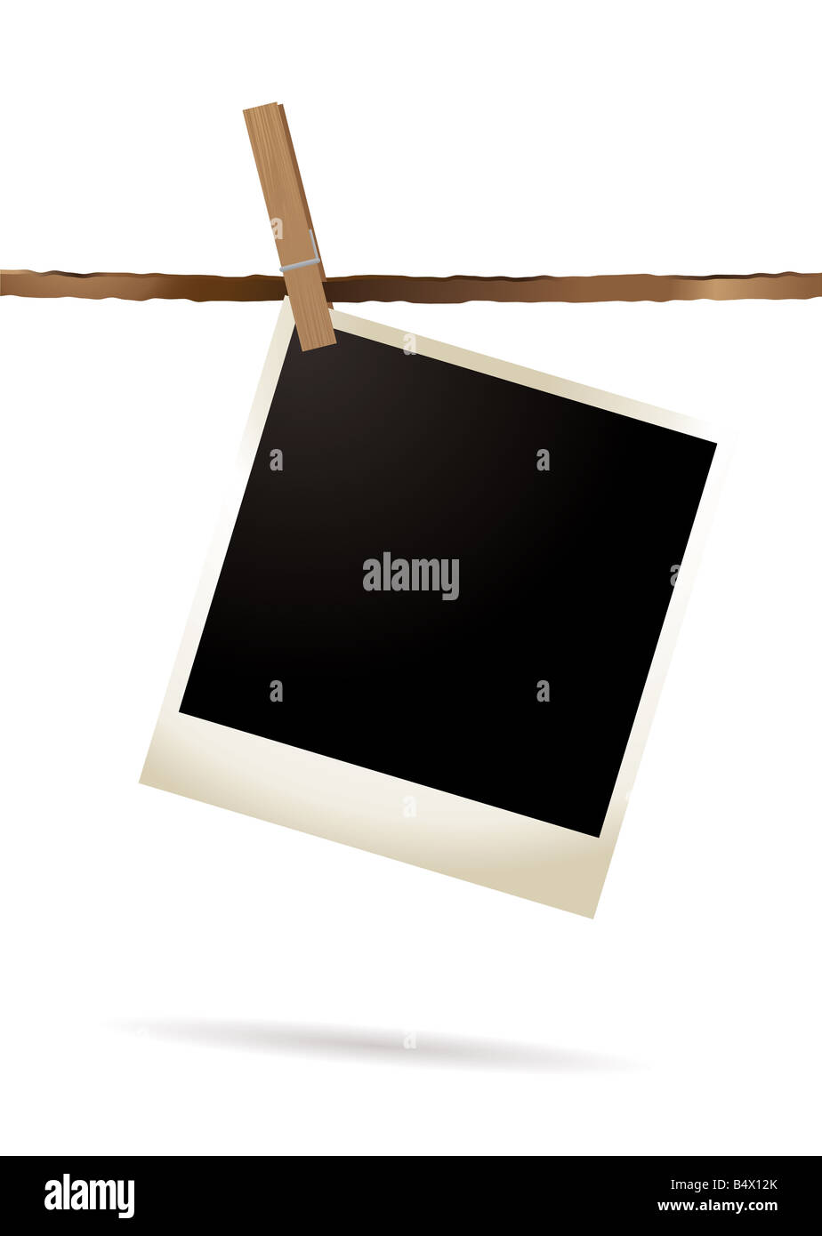 Single polaroid hanging on a piece of string Stock Photo - Alamy