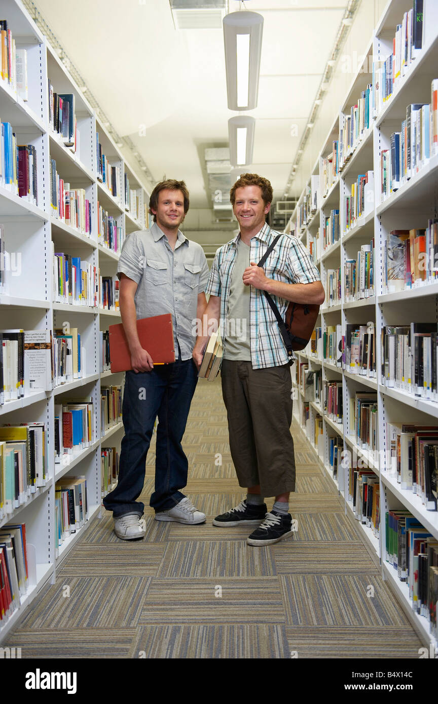 Young students in a library Stock Photo - Alamy