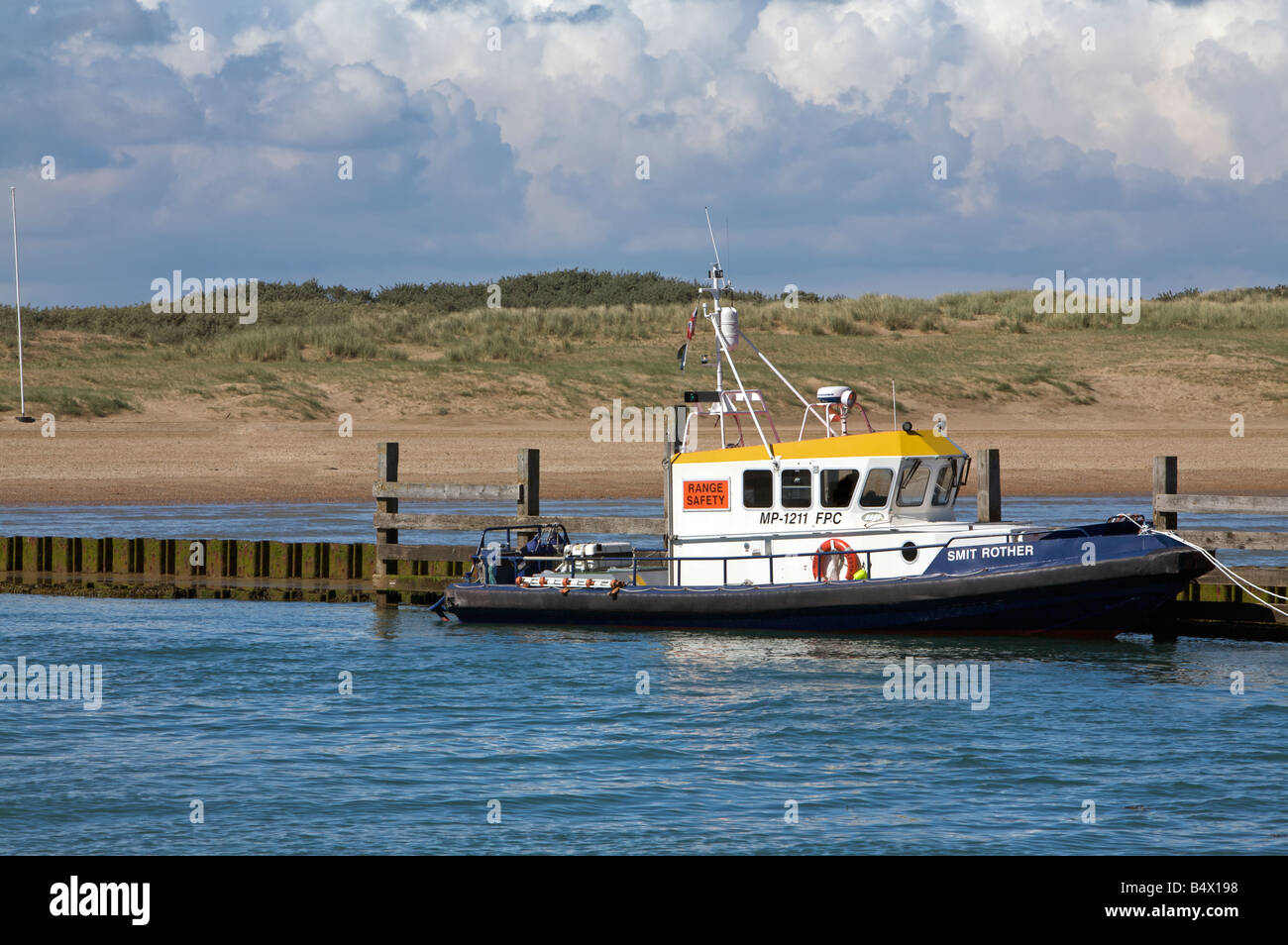 boat on the jetty Stock Photo - Alamy