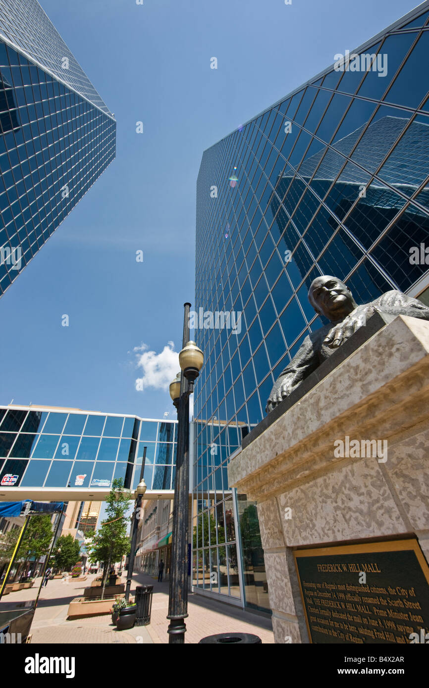 High rise building towers and statue of Frederick W Hill in the ...