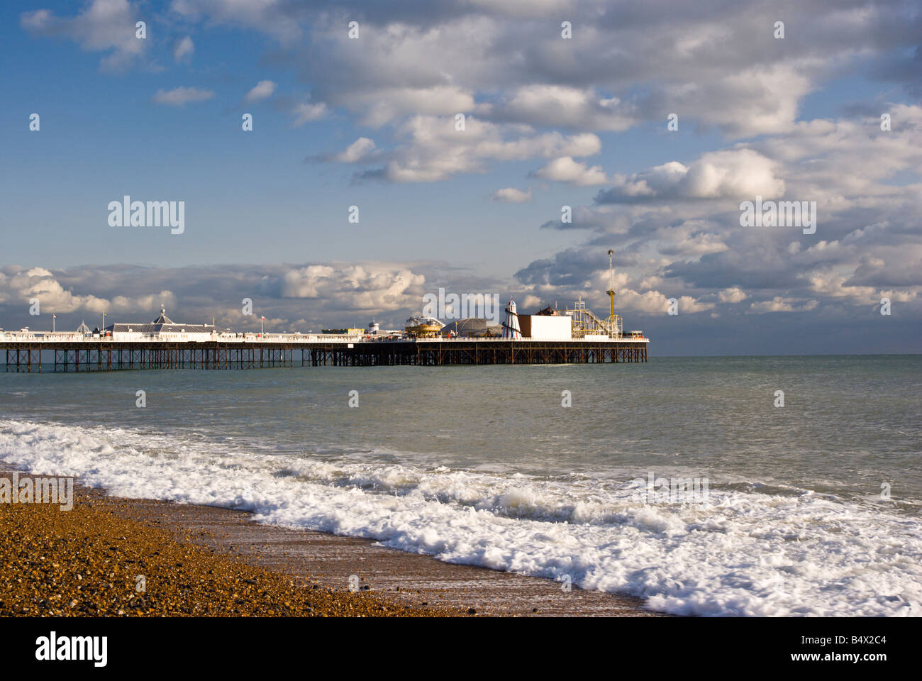 Brighton pier and coastline at sunset Stock Photo - Alamy