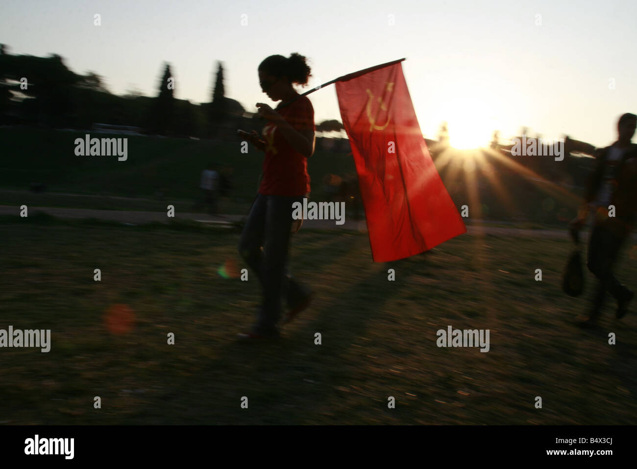 girl with communist soviet union flag at political rally in rome italy ...