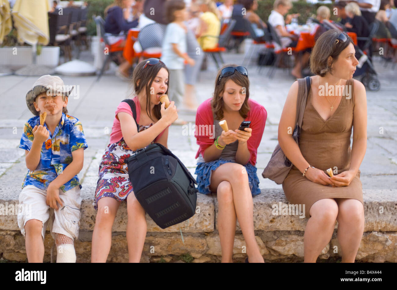 Family enjoy ice cream Hvar Croatia Stock Photo - Alamy