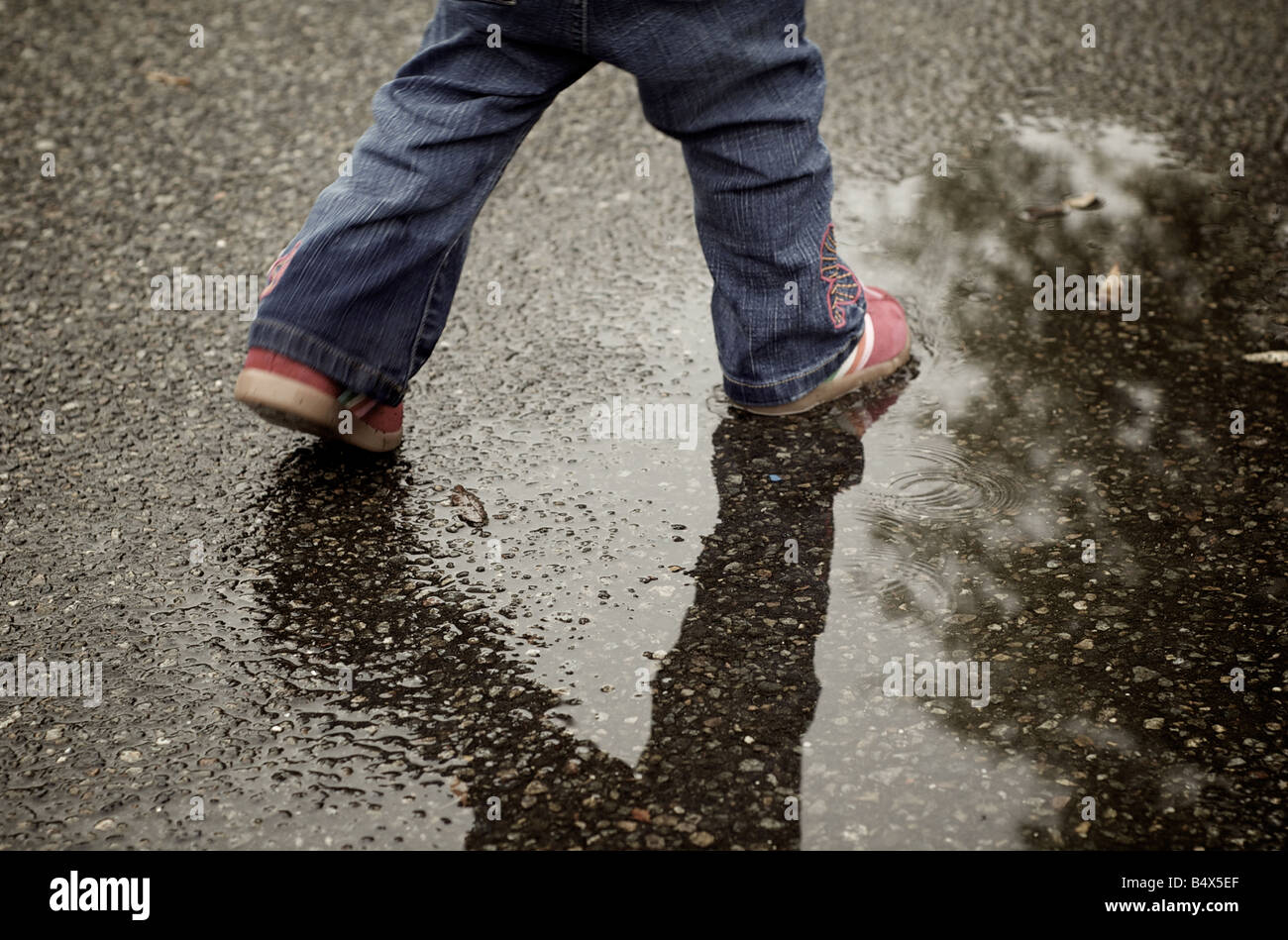 Puddle splash soaked hi-res stock photography and images - Alamy