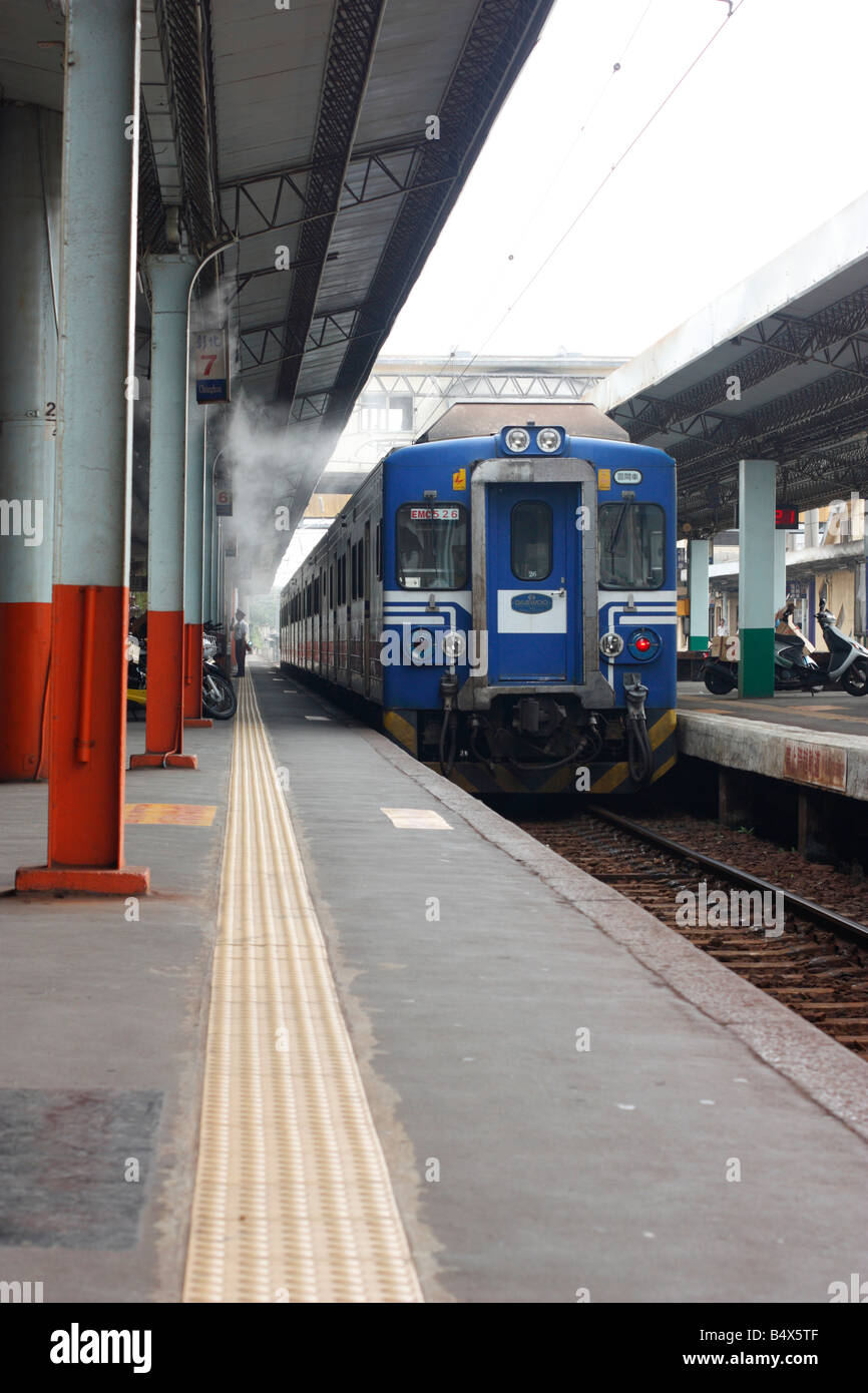 A train leaving the station Stock Photo - Alamy