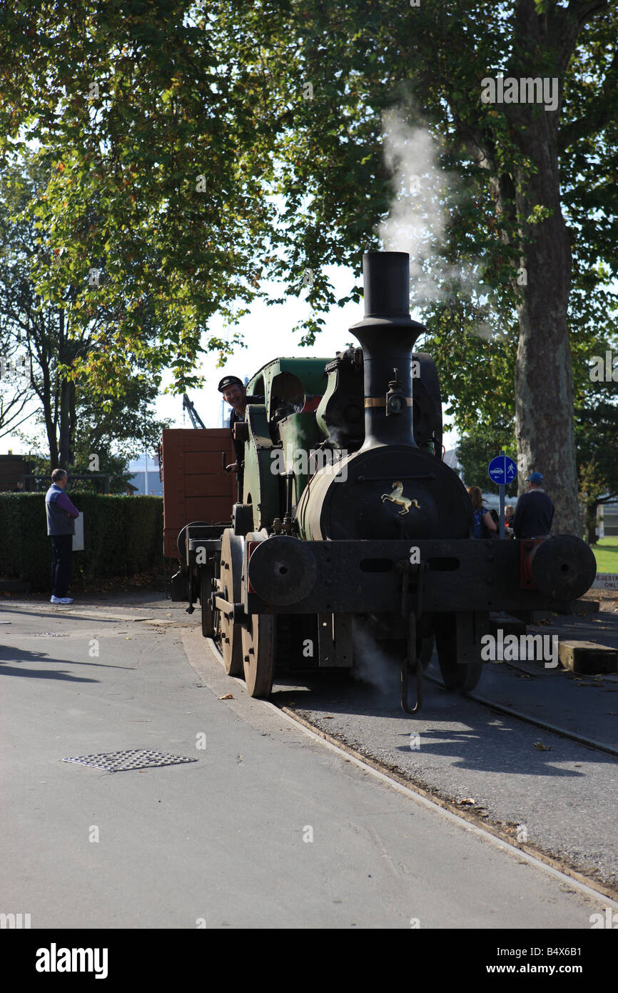 A working steam locomotive hauling wagons at The Historic Dockyard in ...