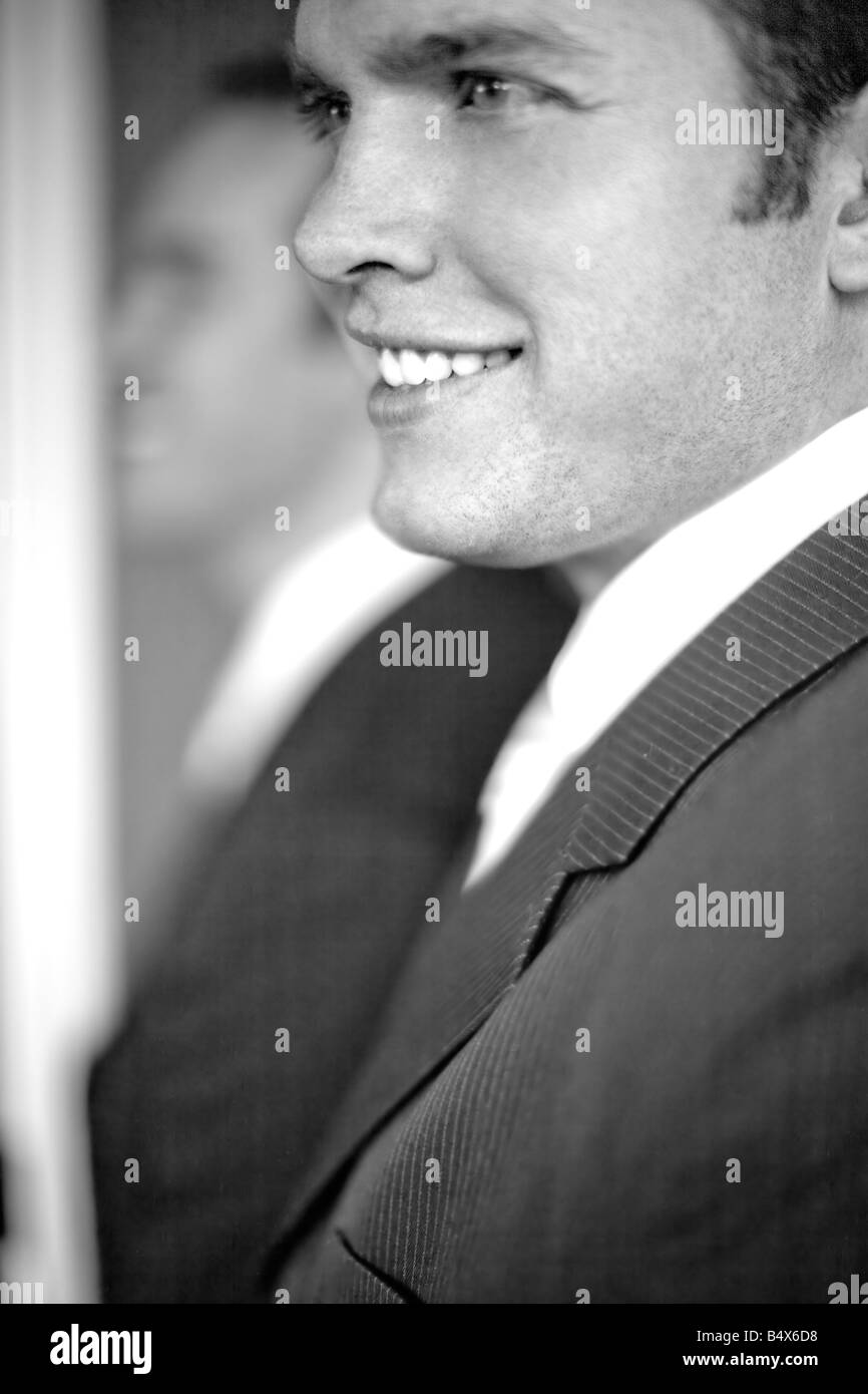 Two happy businesspeople smile Black and White Stock Photos & Images ...