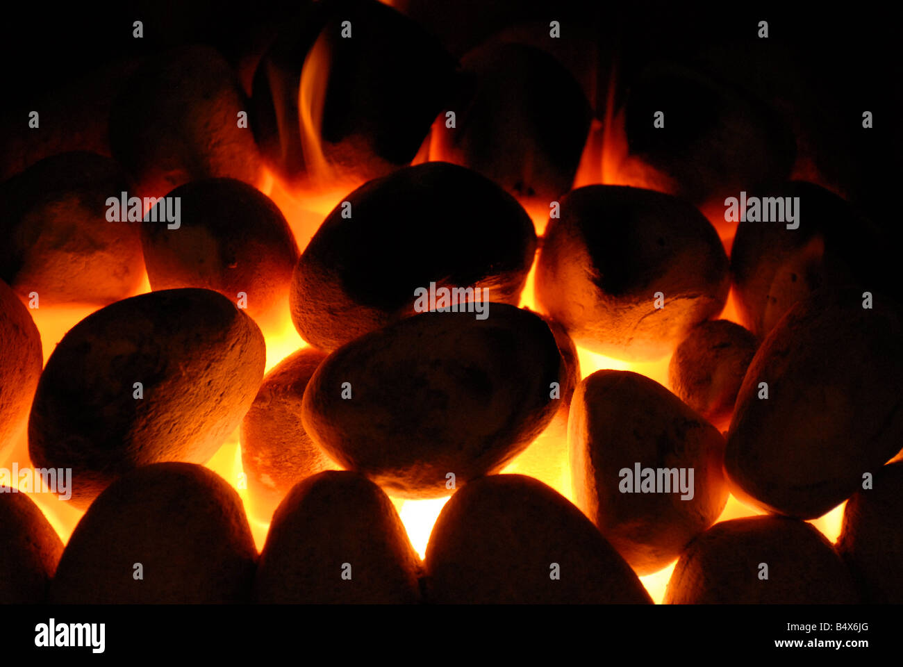 Red hot coals in artificial gas fire Stock Photo - Alamy