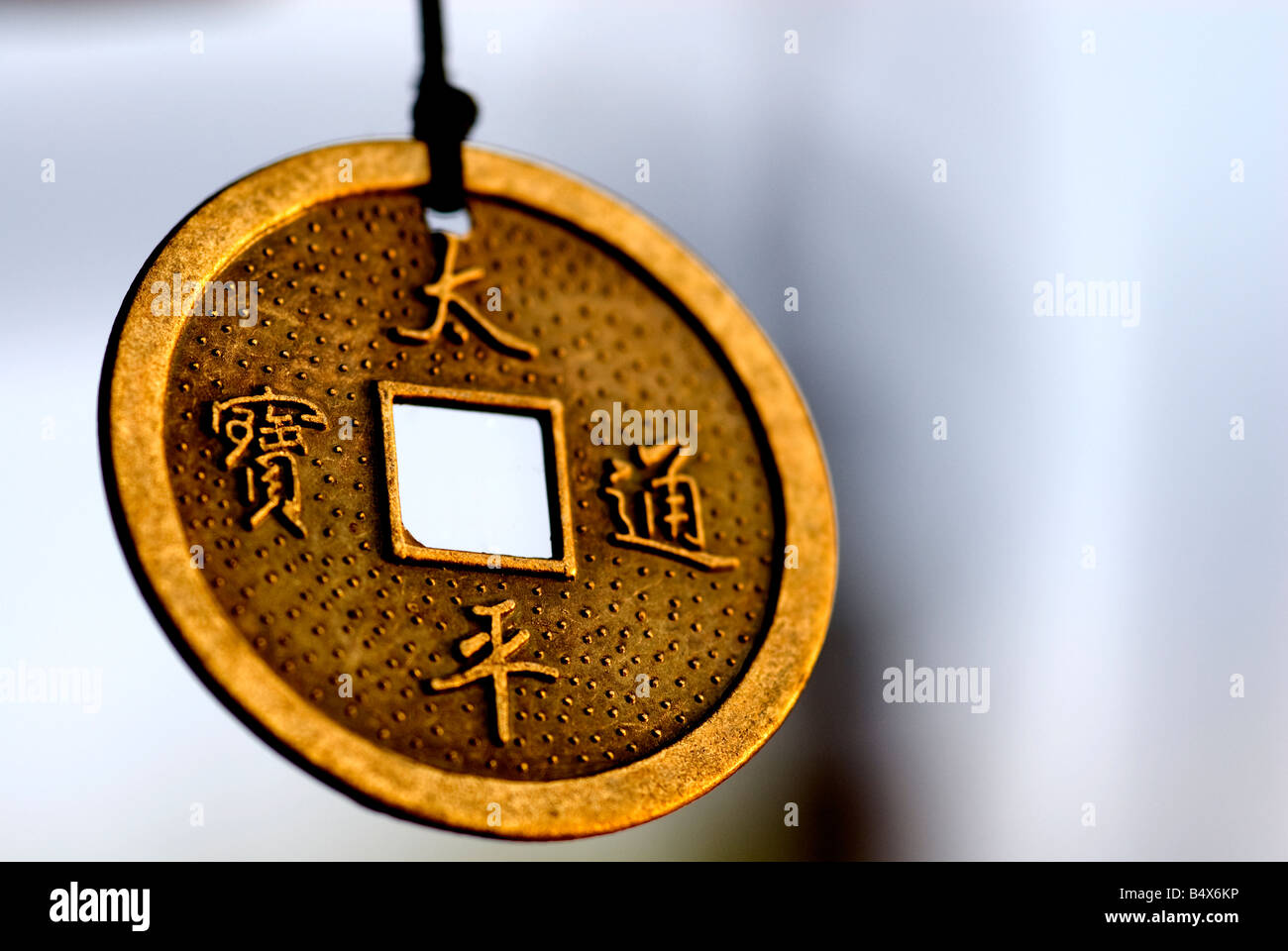 Chinese coin symbol hi-res stock photography and images - Alamy