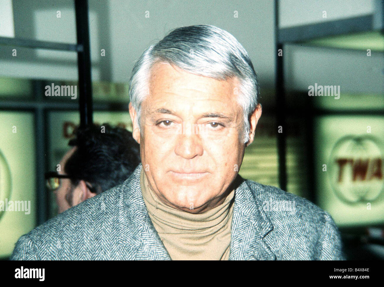 Cary Grant actor polo neck grey jacket Stock Photo - Alamy