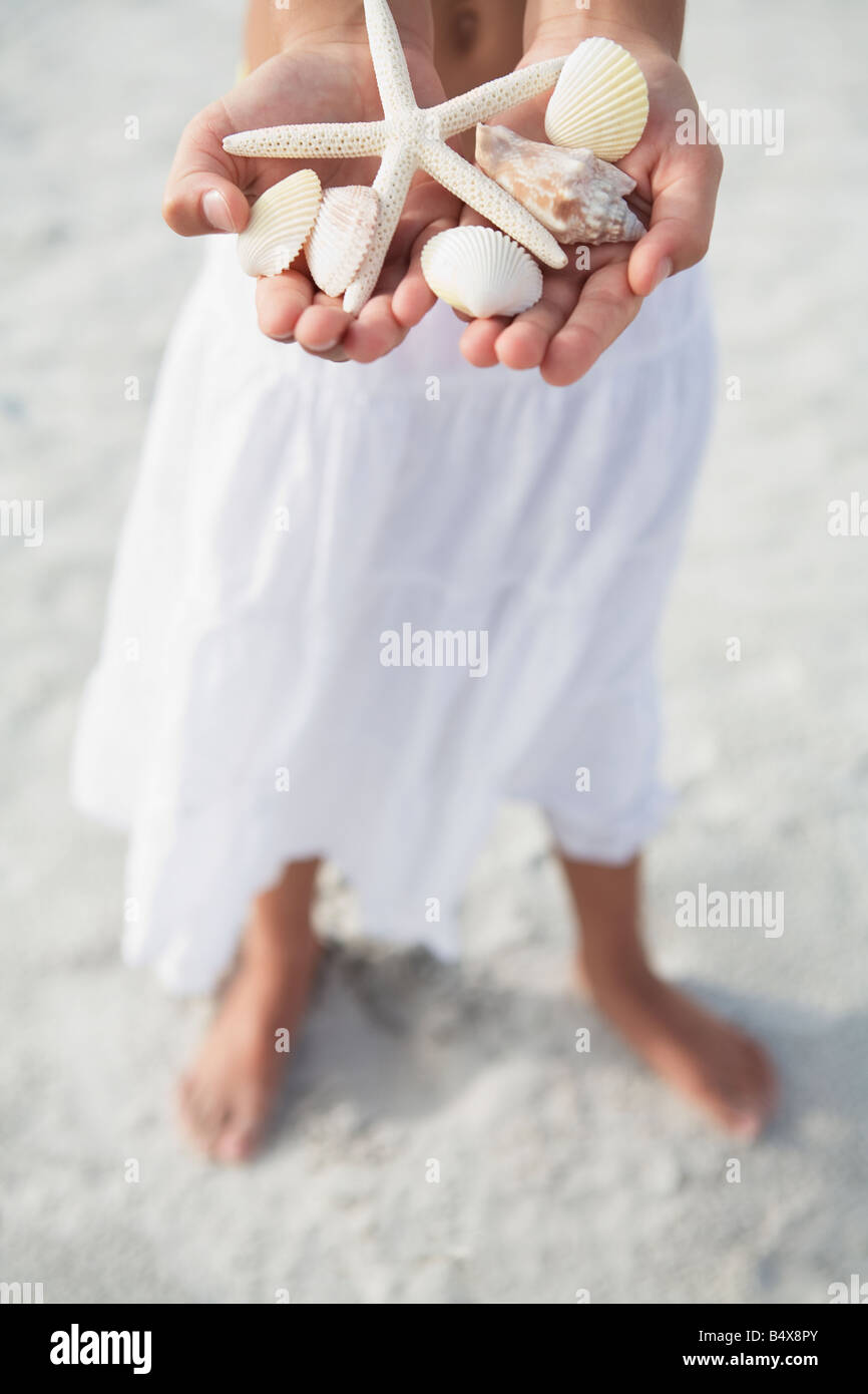 Girl Holding Starfish High Resolution Stock Photography and Images - Alamy
