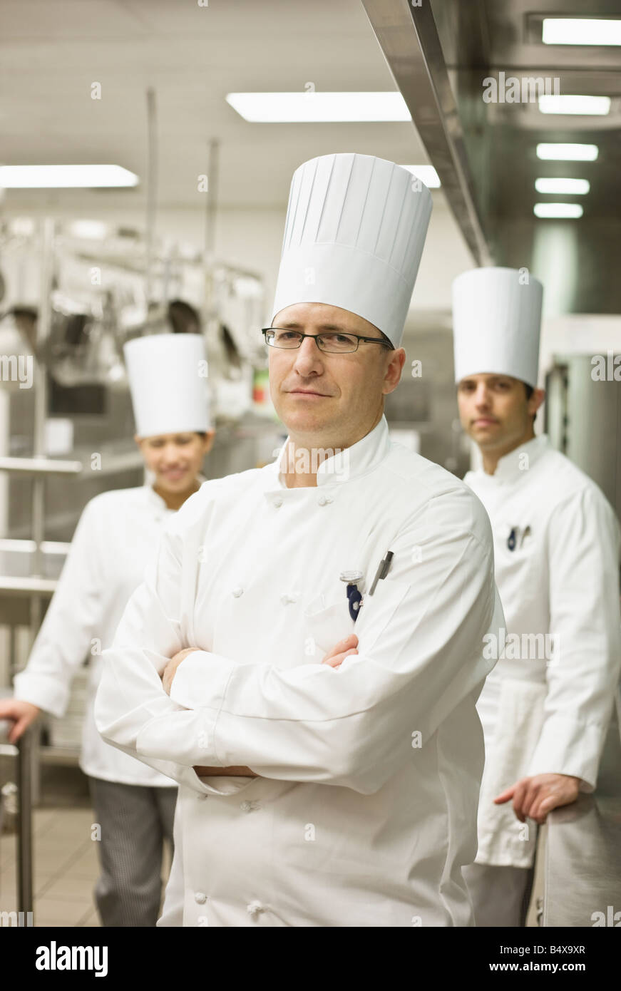 Professional chefs in uniforms Stock Photo - Alamy