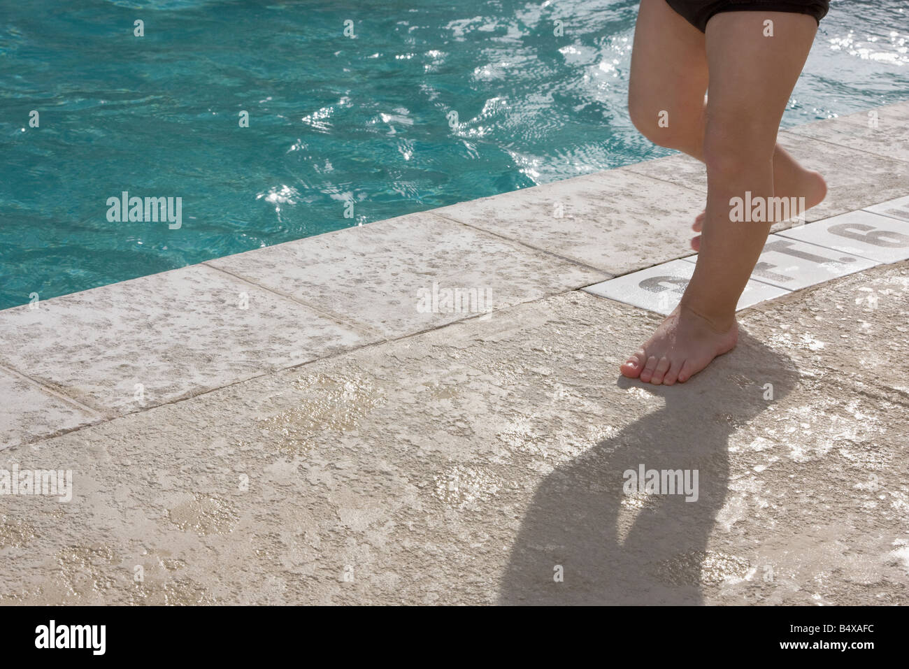 Walking into pool hi-res stock photography and images - Alamy