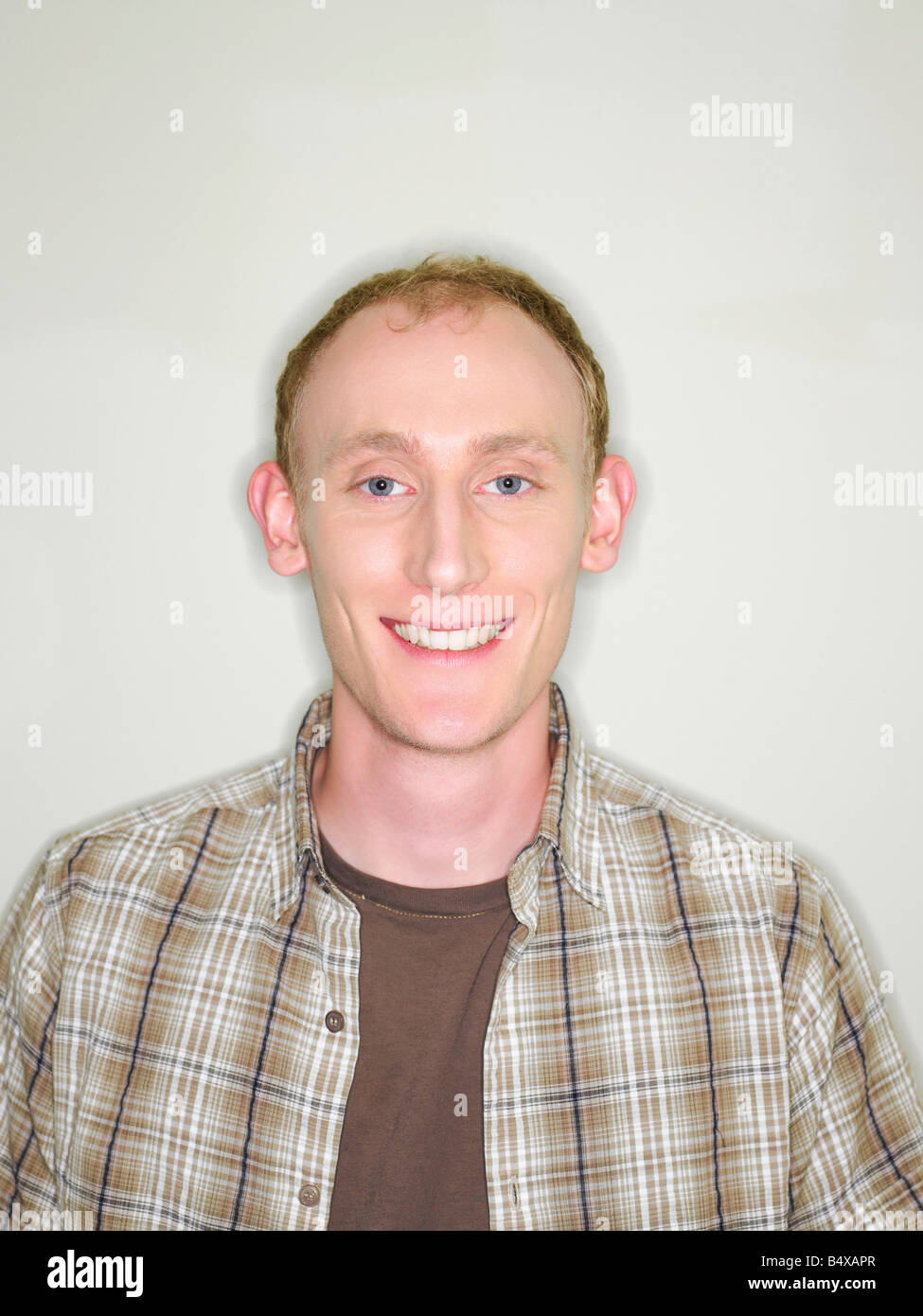 Portrait of geeky young man Stock Photo - Alamy