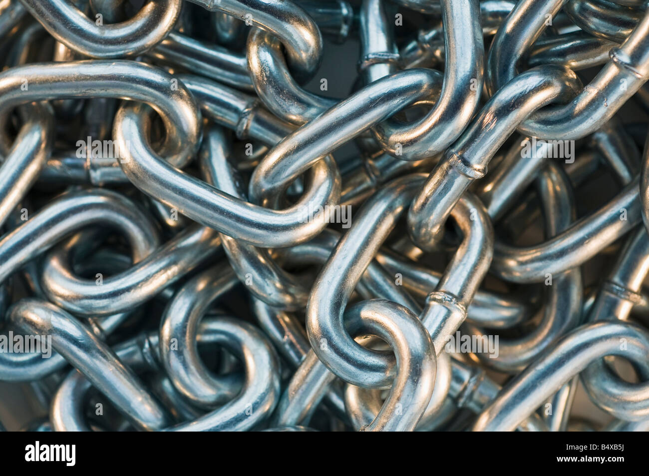 Close up of pile of metal chain Stock Photo - Alamy