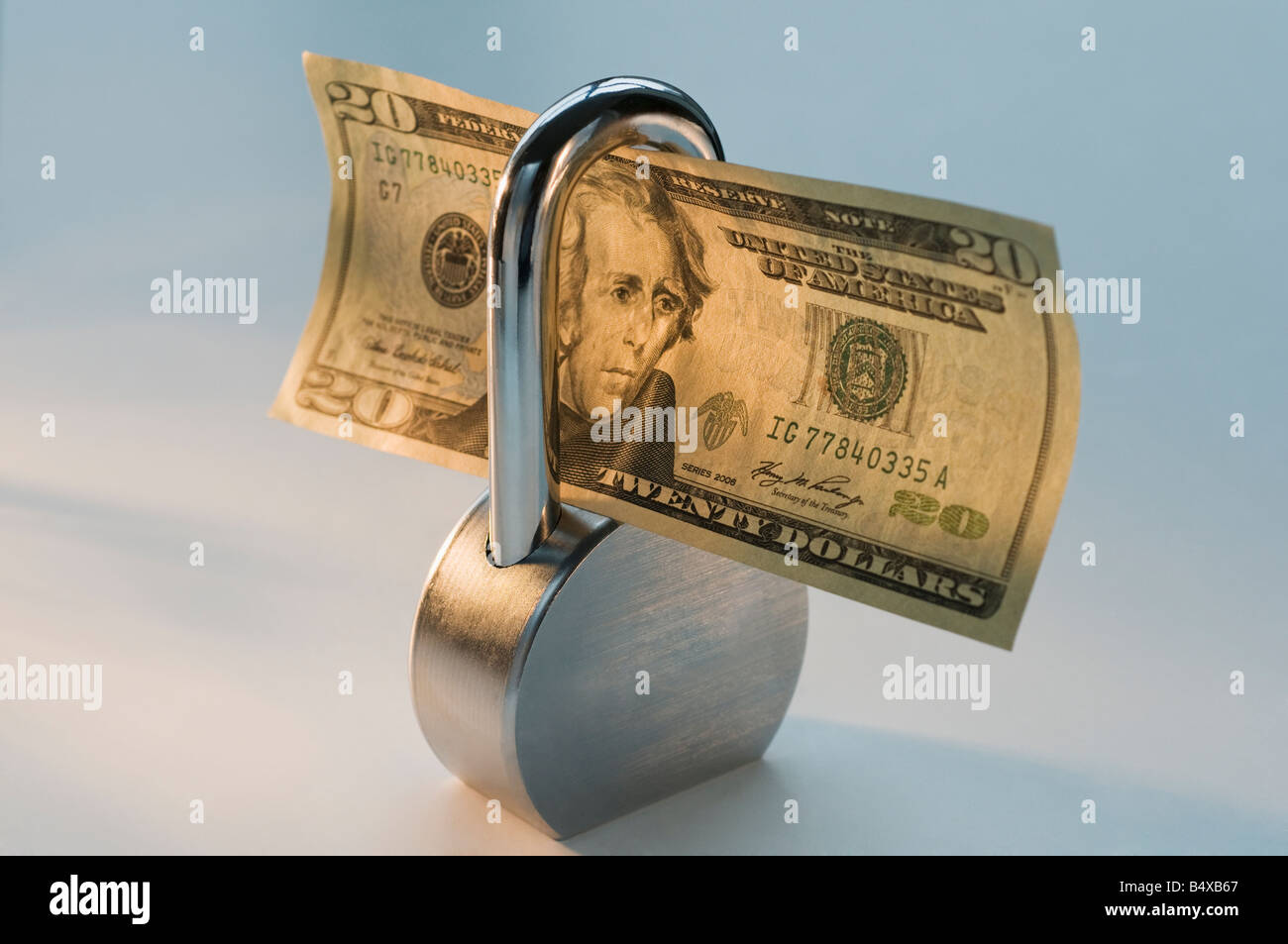 Close up lock and dollar bill Stock Photo - Alamy