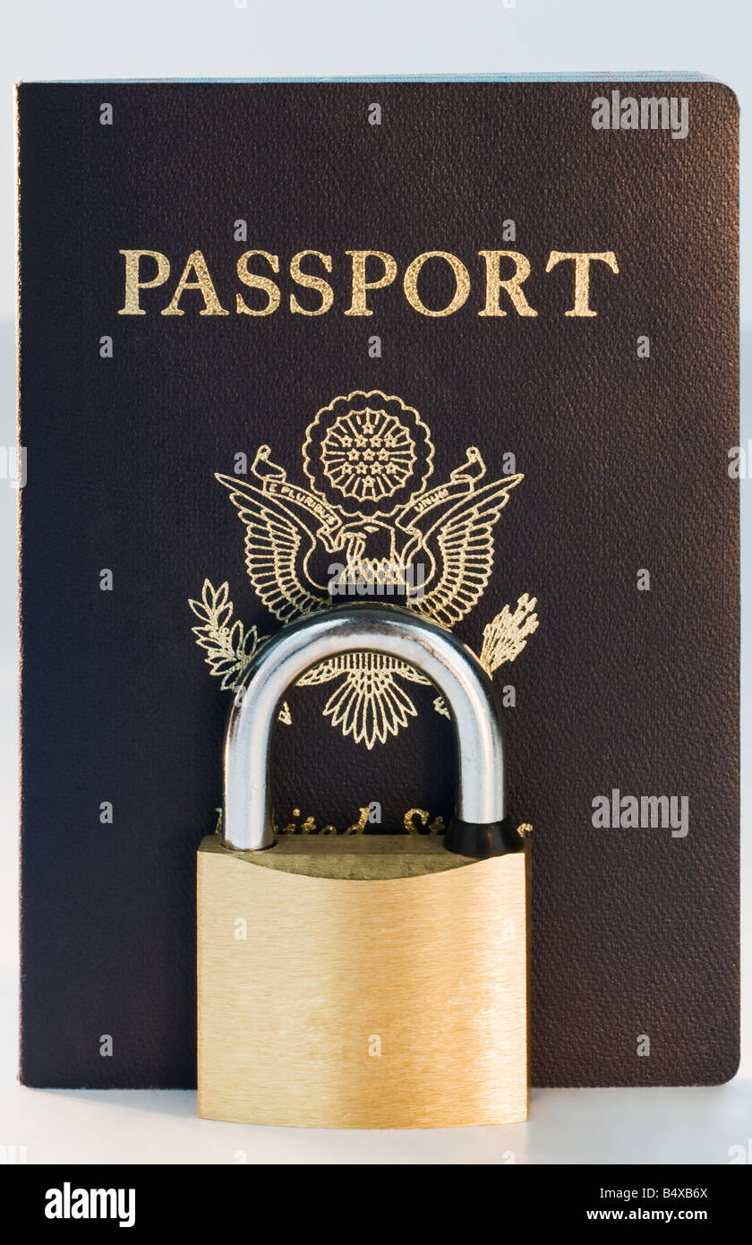 Close up of lock and passport Stock Photo - Alamy